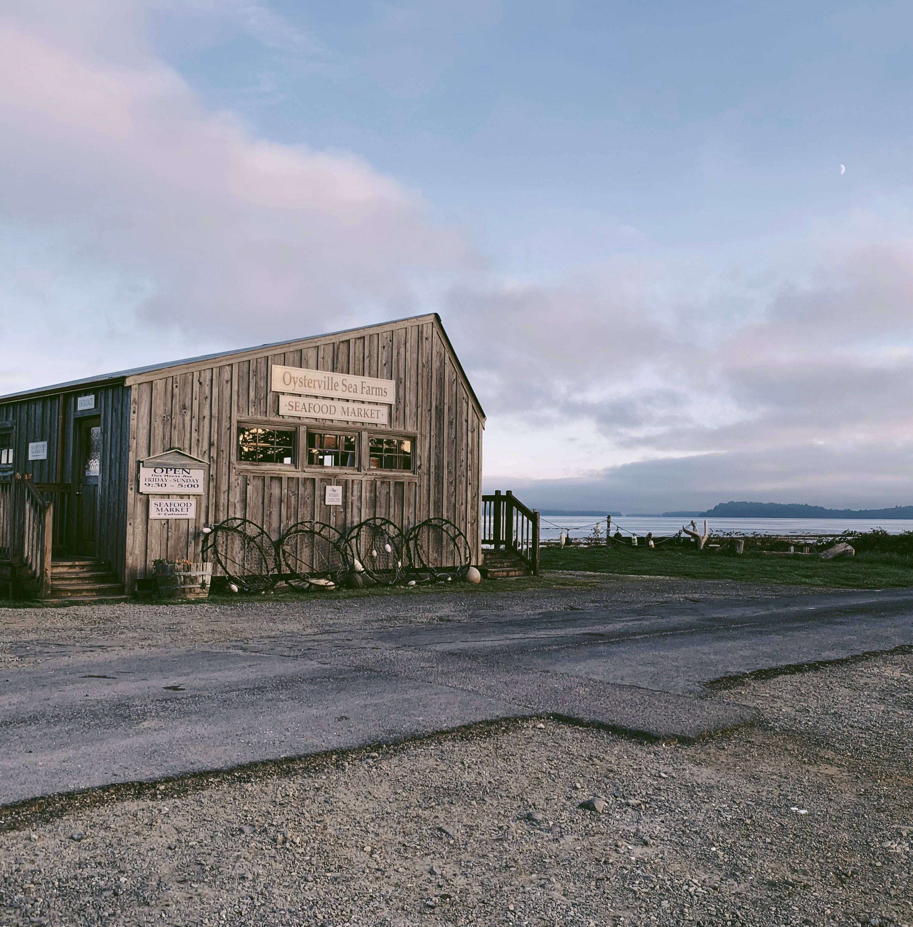 Rustic Seafood Market by the Ocean at Dusk · Free Stock Photo
