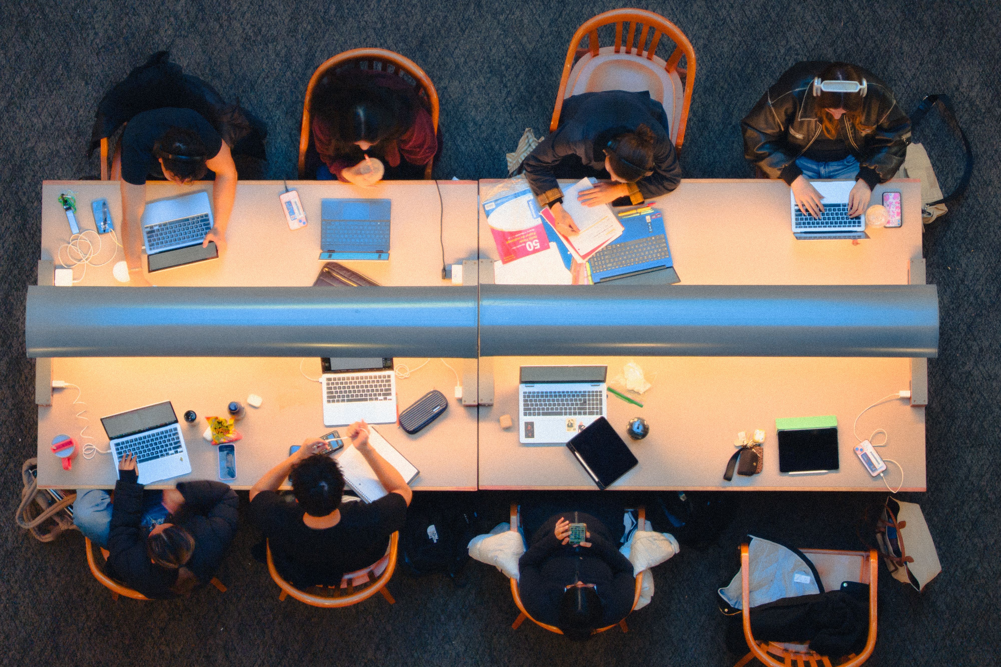 Top View of Students Studying in Library · Free Stock Photo