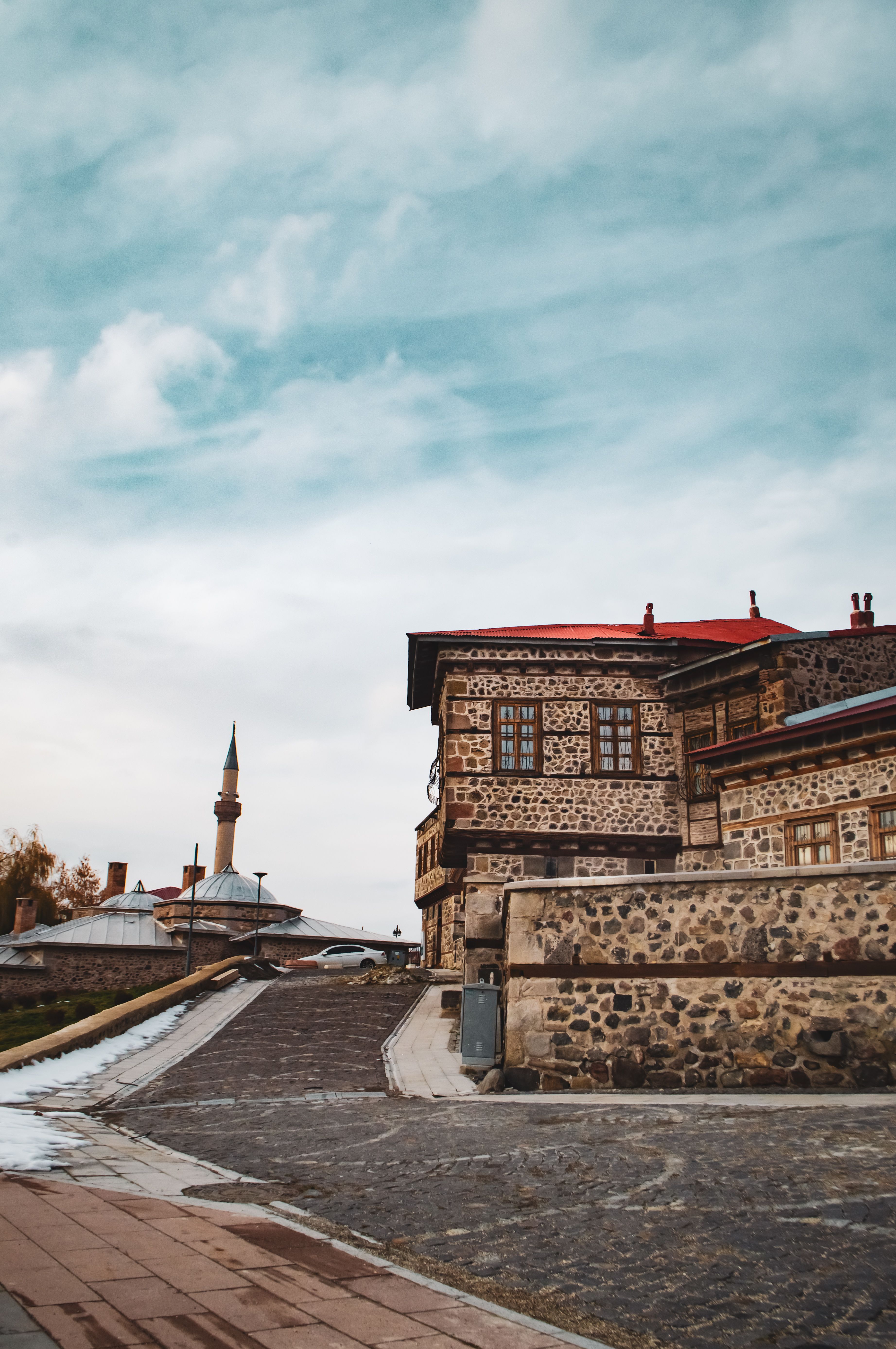Historic Turkish Tower with National Flags · Free Stock Photo