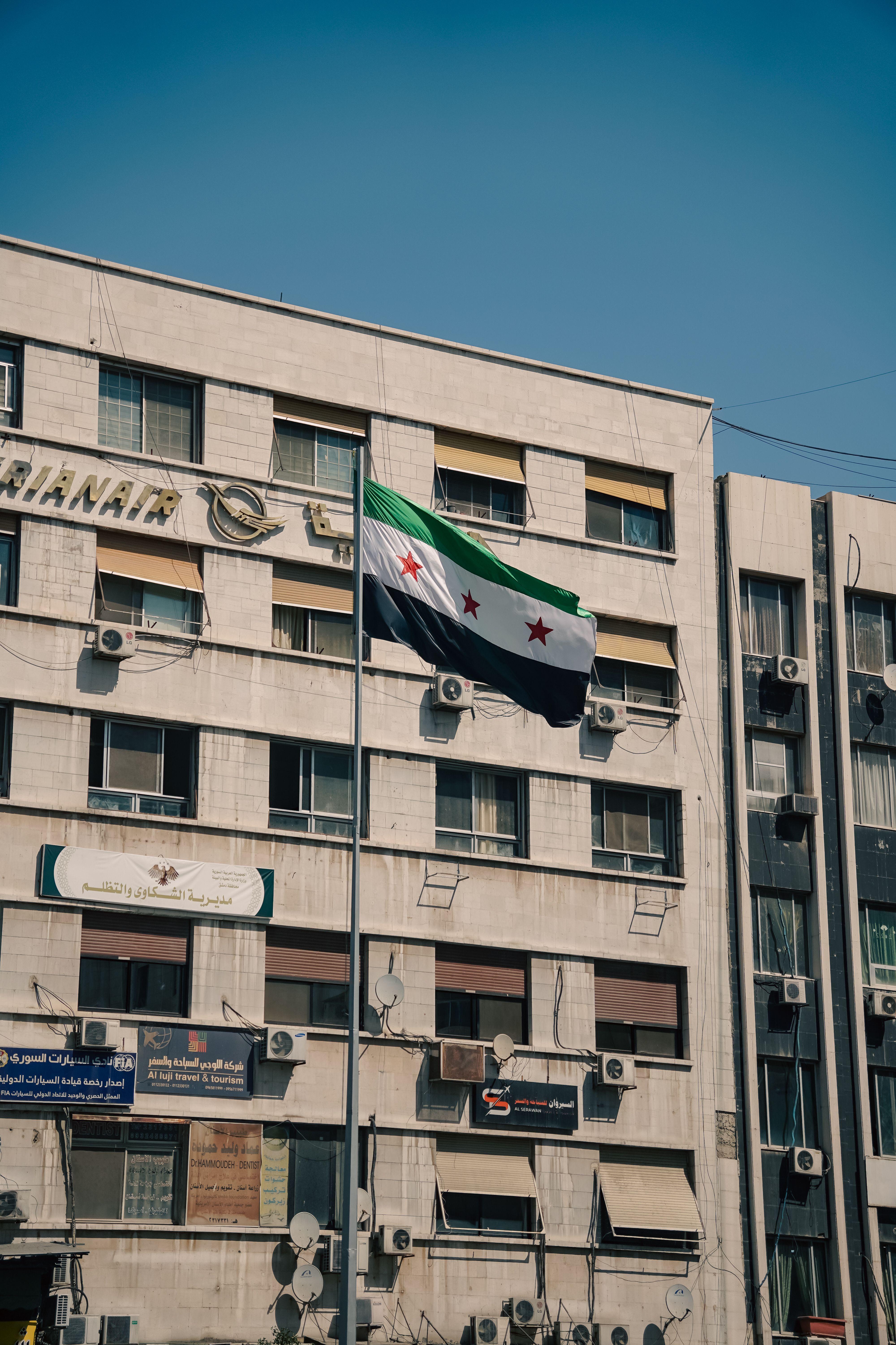 Syrian Flag on Building in Damascus, Syria · Free Stock Photo