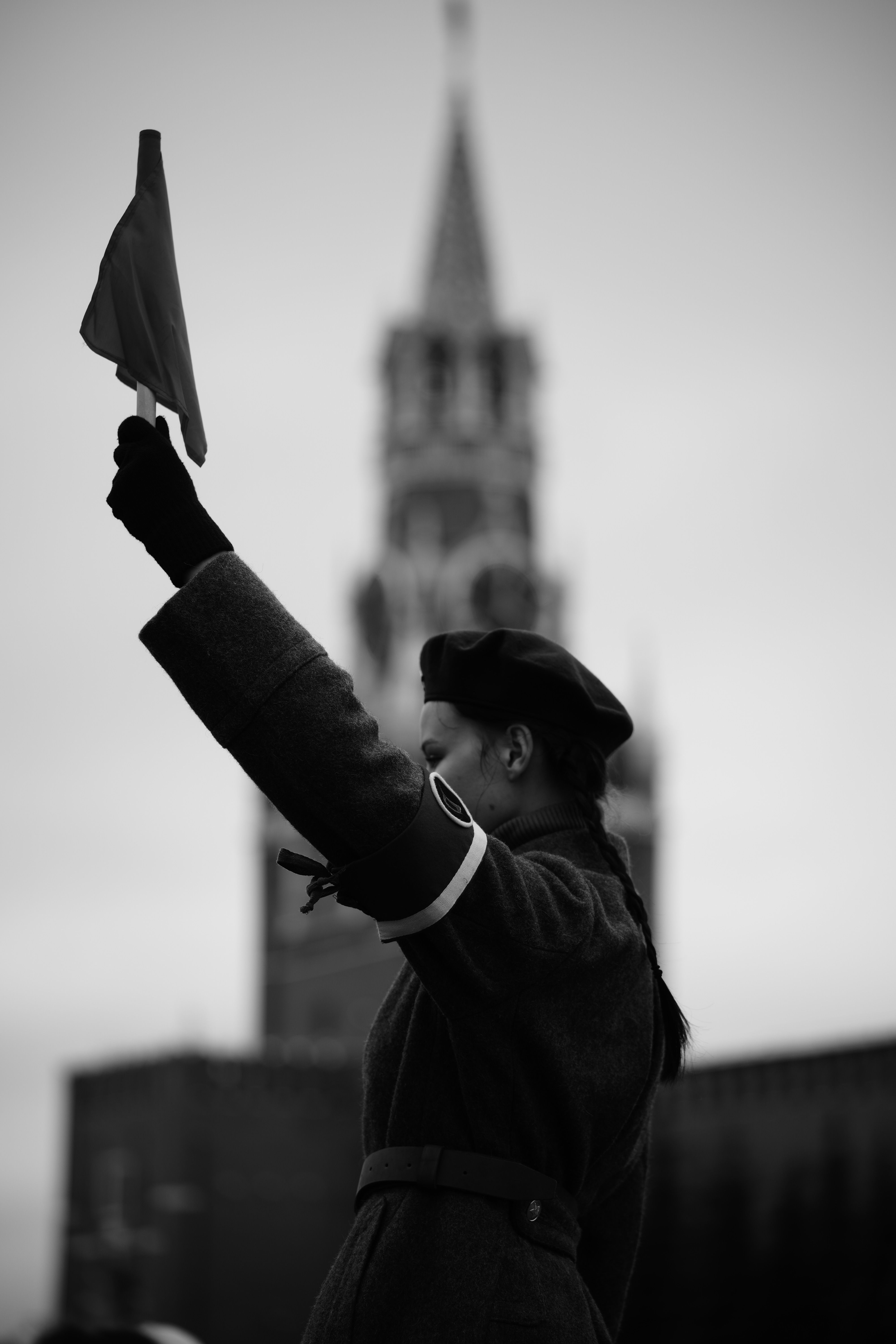 Historical Parade with Flag near Iconic Tower · Free Stock Photo