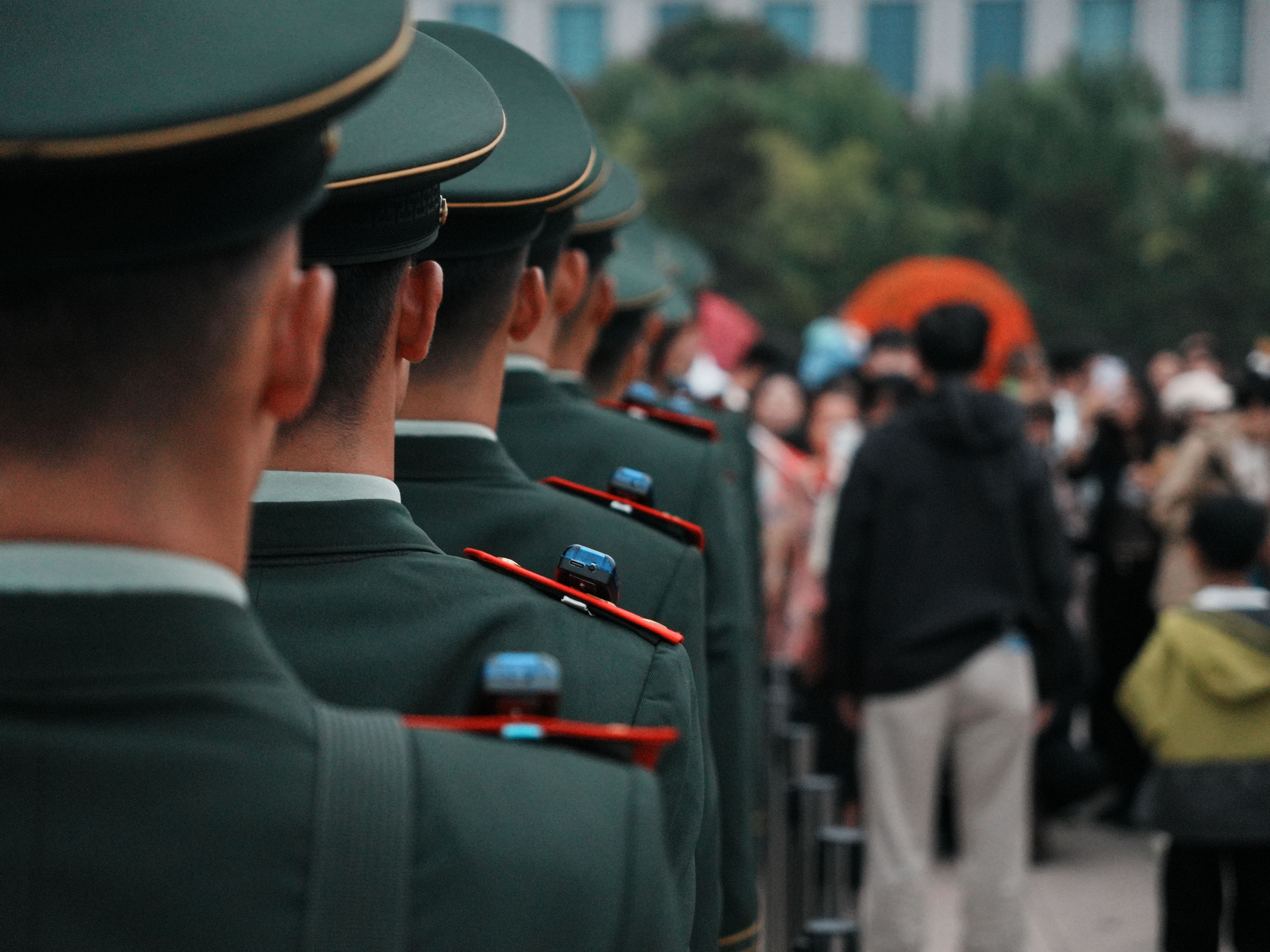 Military officers lined up in uniform outdoors · Free Stock Photo