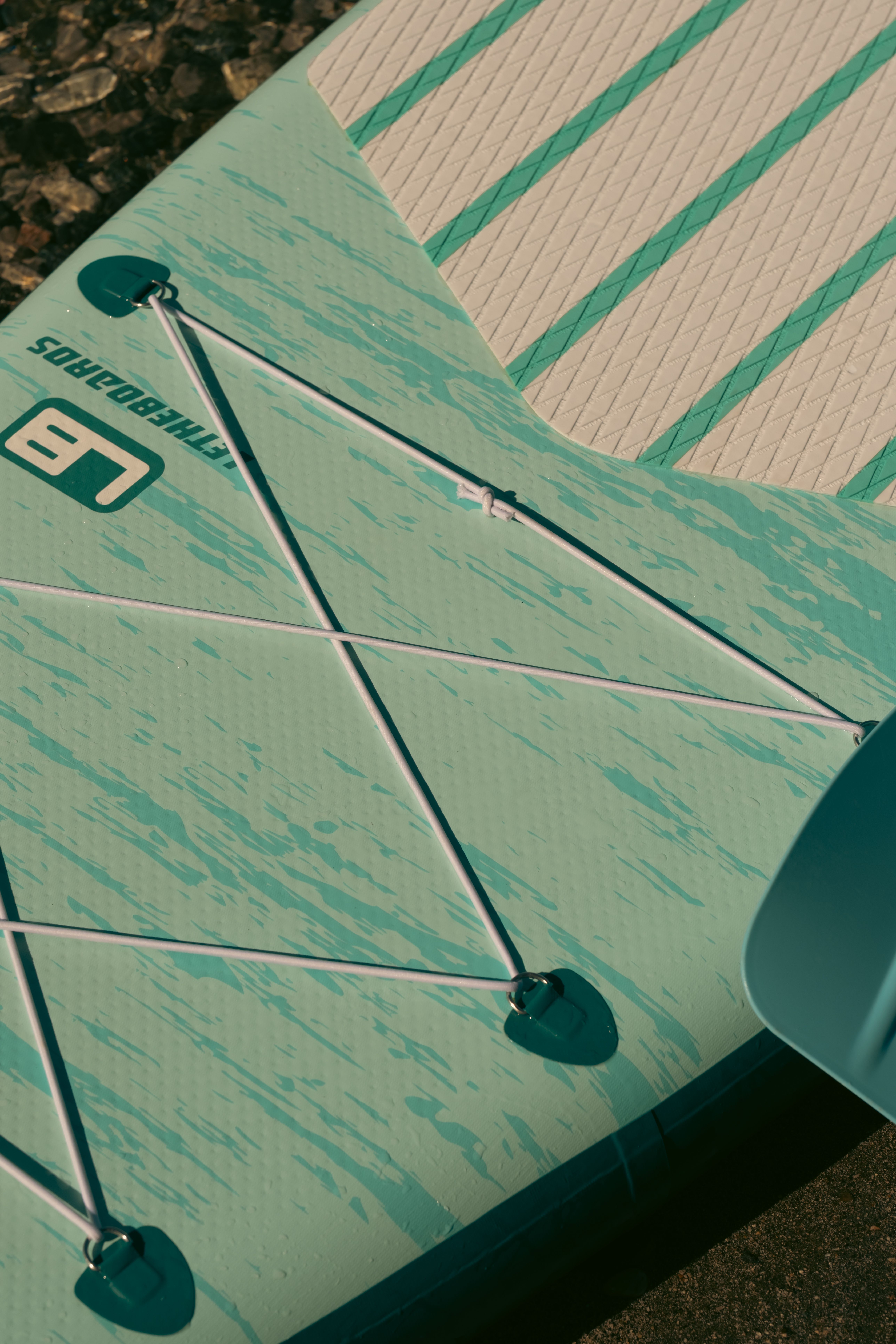 Close-up of a Stand-Up Paddleboard on a Sunny Day · Free Stock Photo
