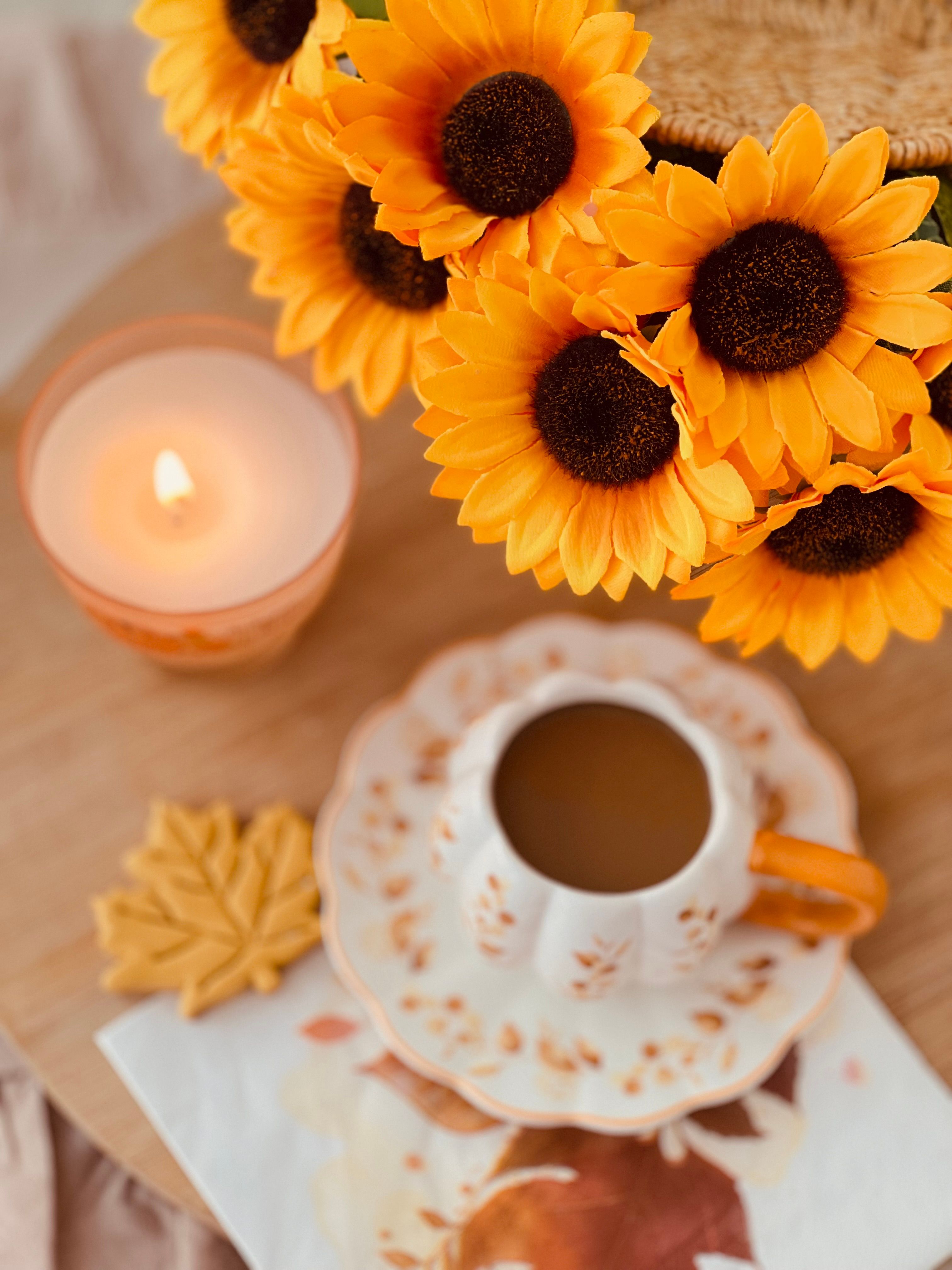 Warm Autumn Coffee Setup with Sunflowers · Free Stock Photo