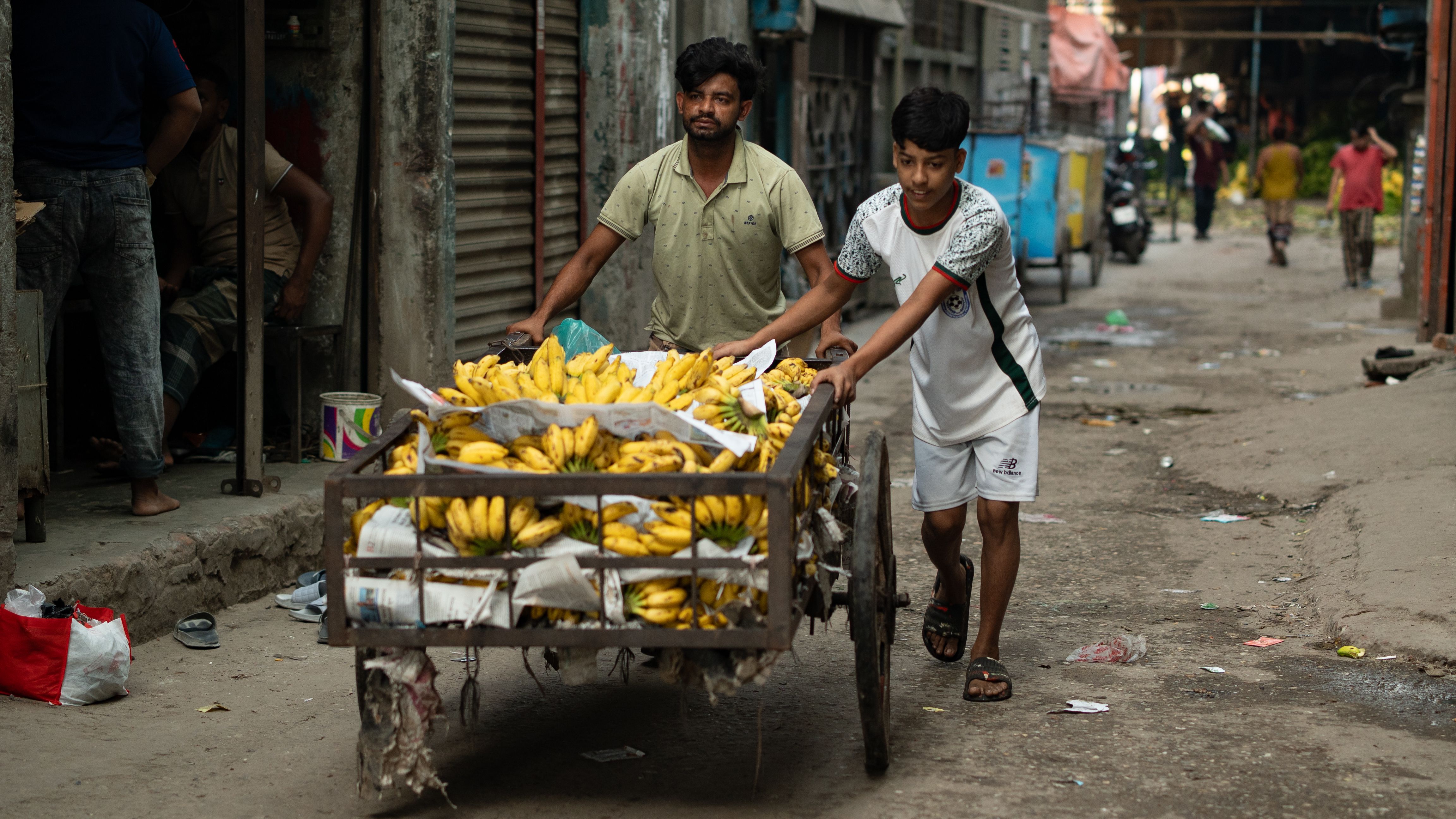Daily Life in Dhaka: Banana Cart on City Street · Free Stock Photo