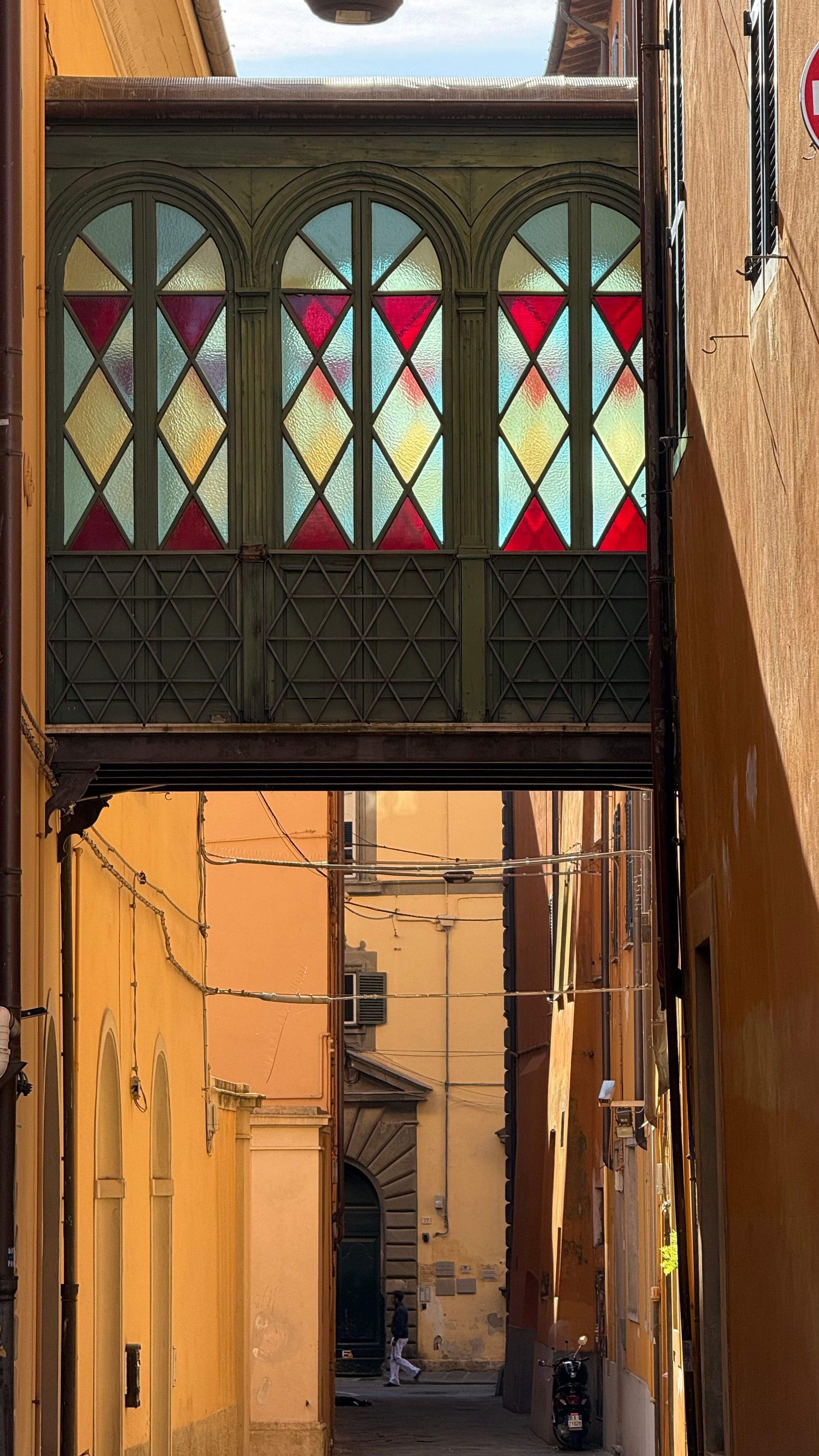 Colorful Stained Glass Bridge in Old Alleyway · Free Stock Photo