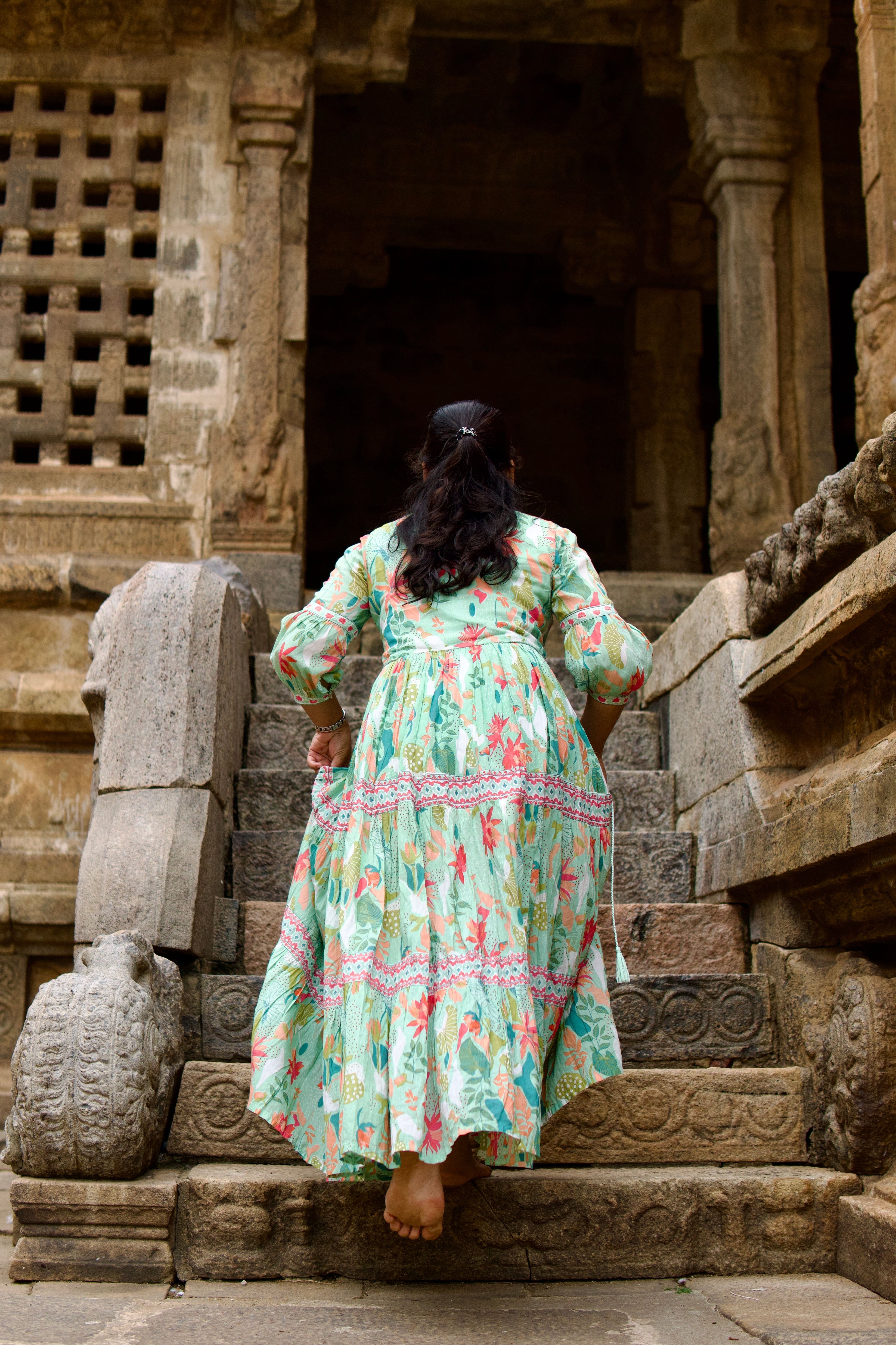Woman Ascending Ancient Stone Steps Outdoors · Free Stock Photo