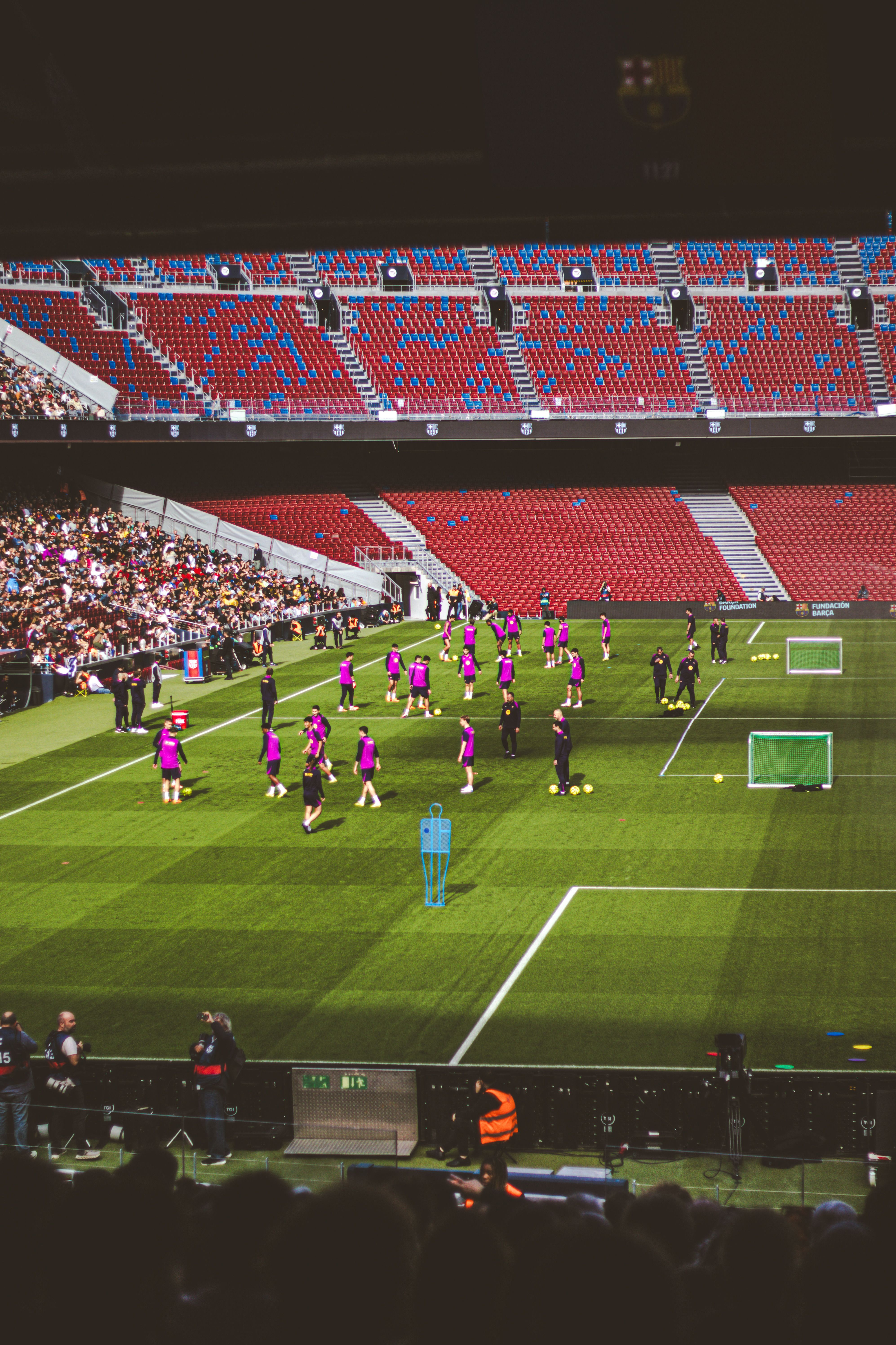 Soccer Team Training at Iconic Stadium · Free Stock Photo