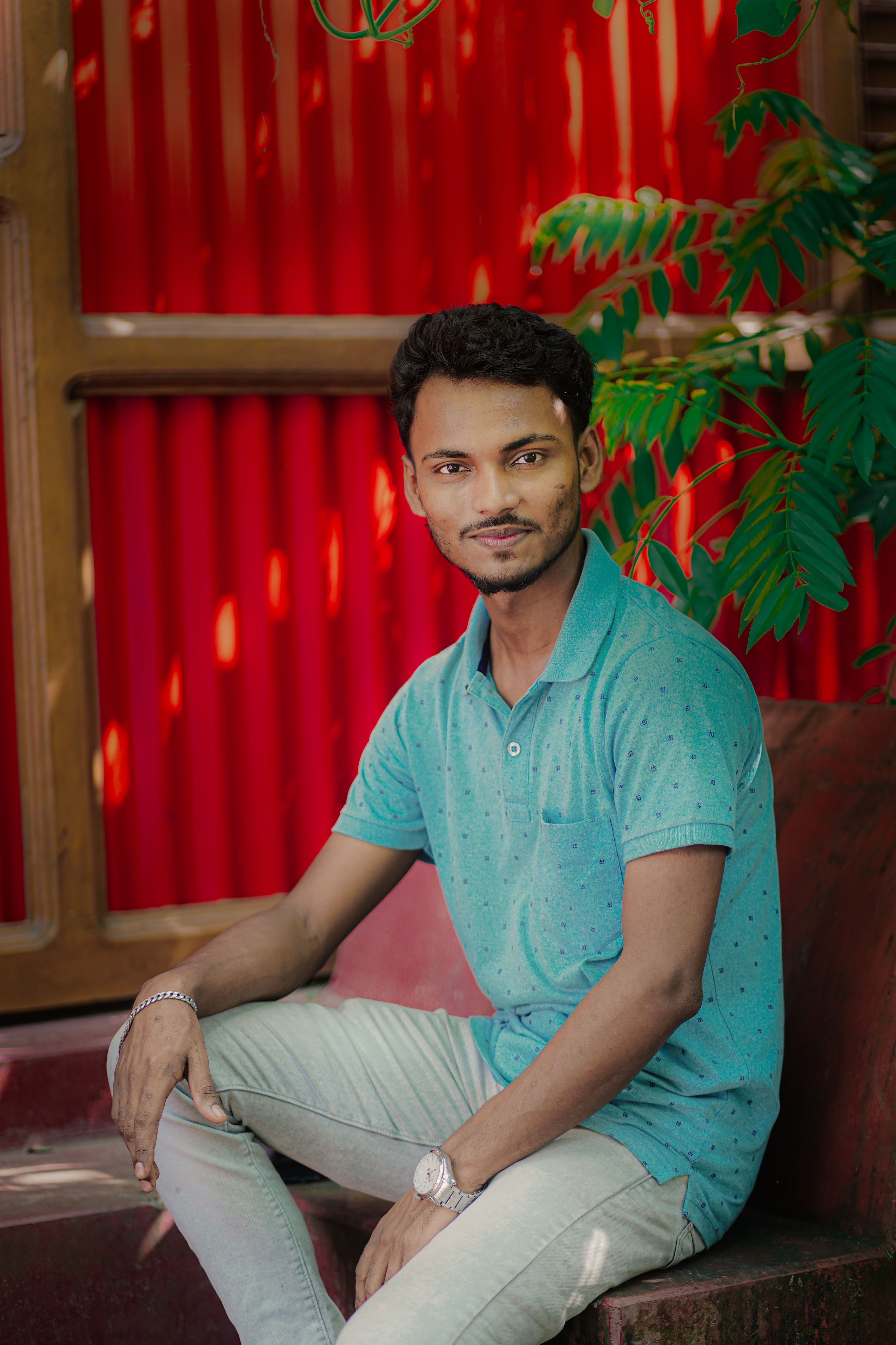 Casual Portrait with Red and Green Backdrop · Free Stock Photo