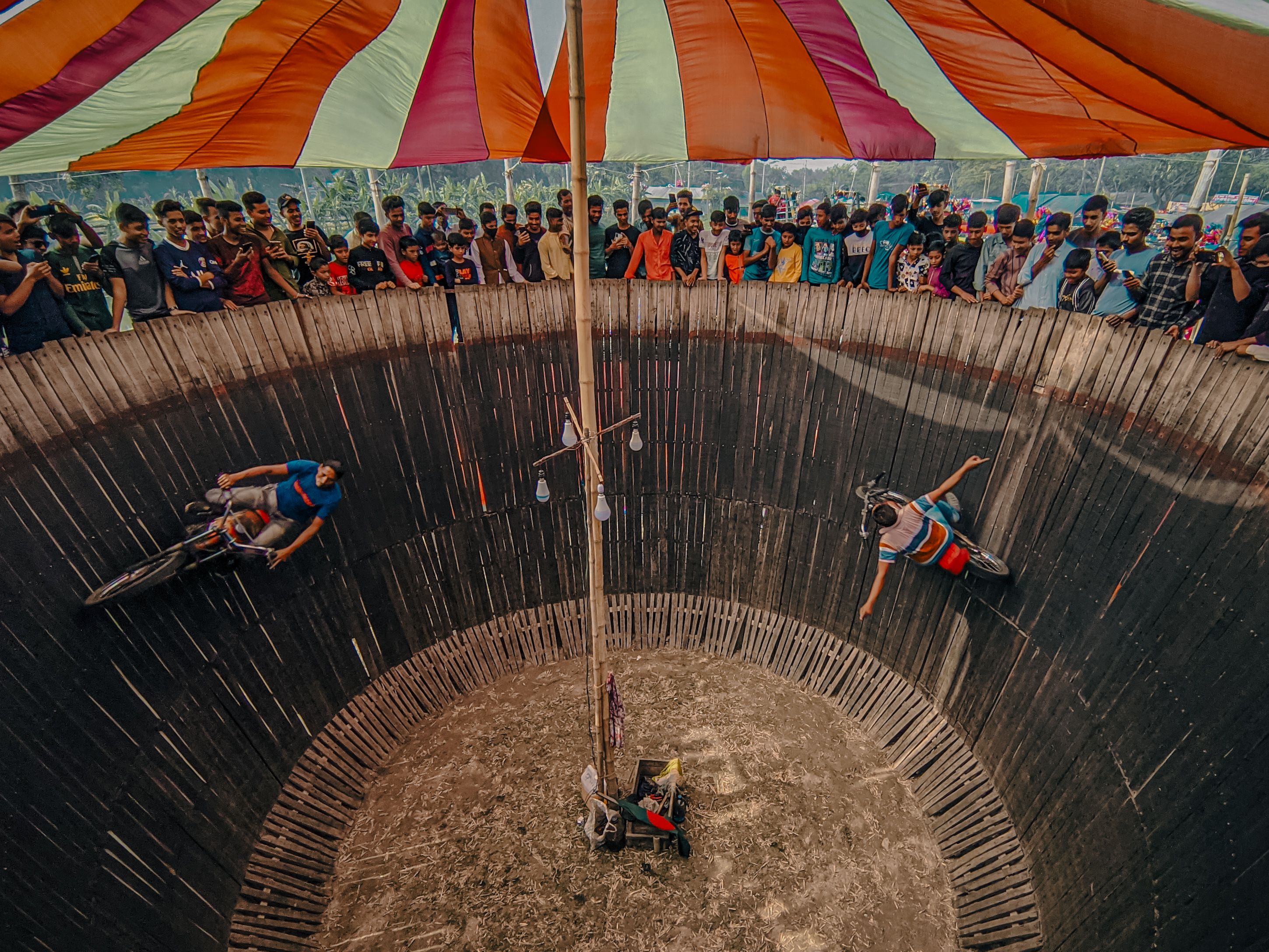 Thrilling Motorcycle Stunt at Bangladesh Carnival · Free Stock Photo