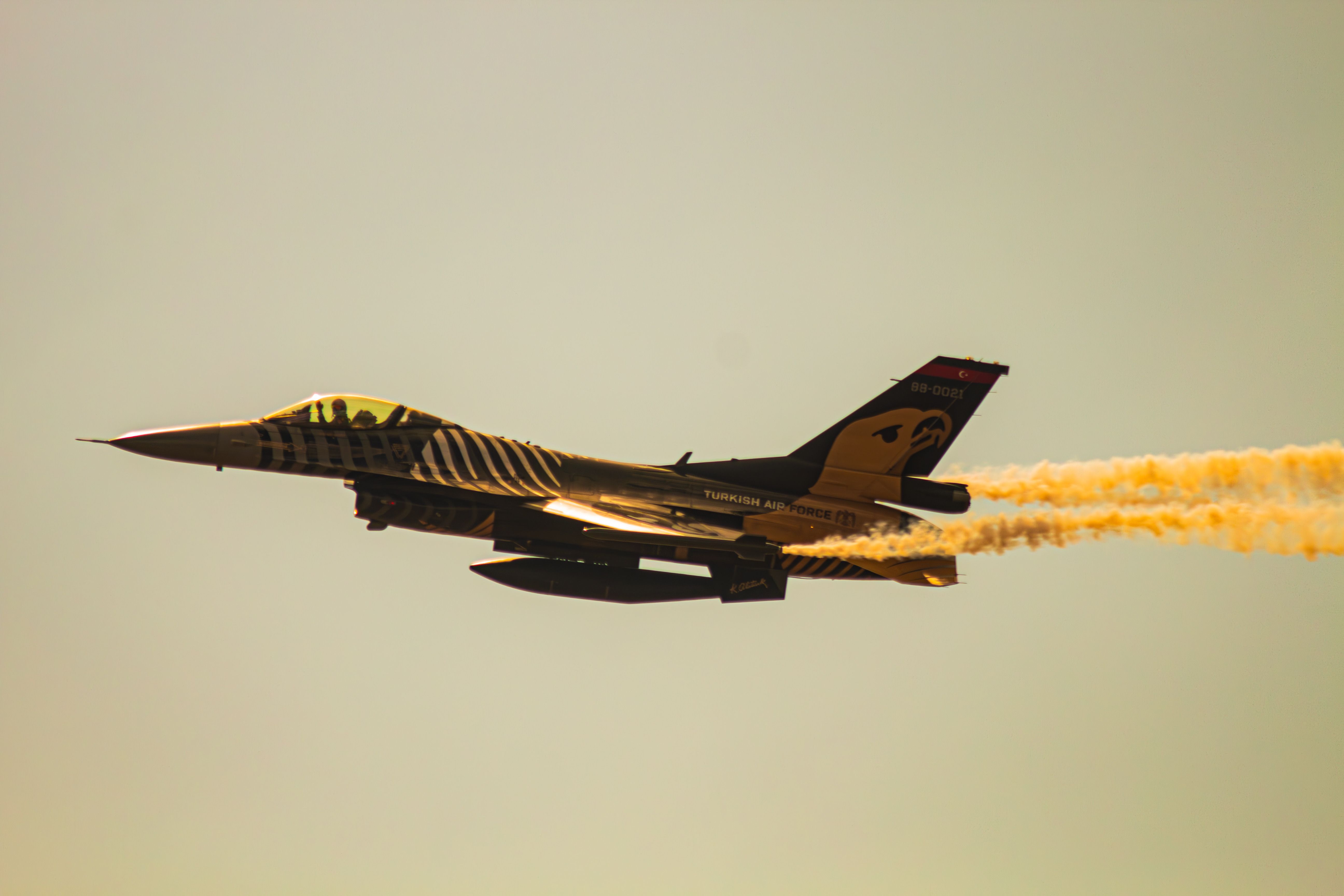 F-16 Fighter Jet in Mid-air with Vapor Trails · Free Stock Photo