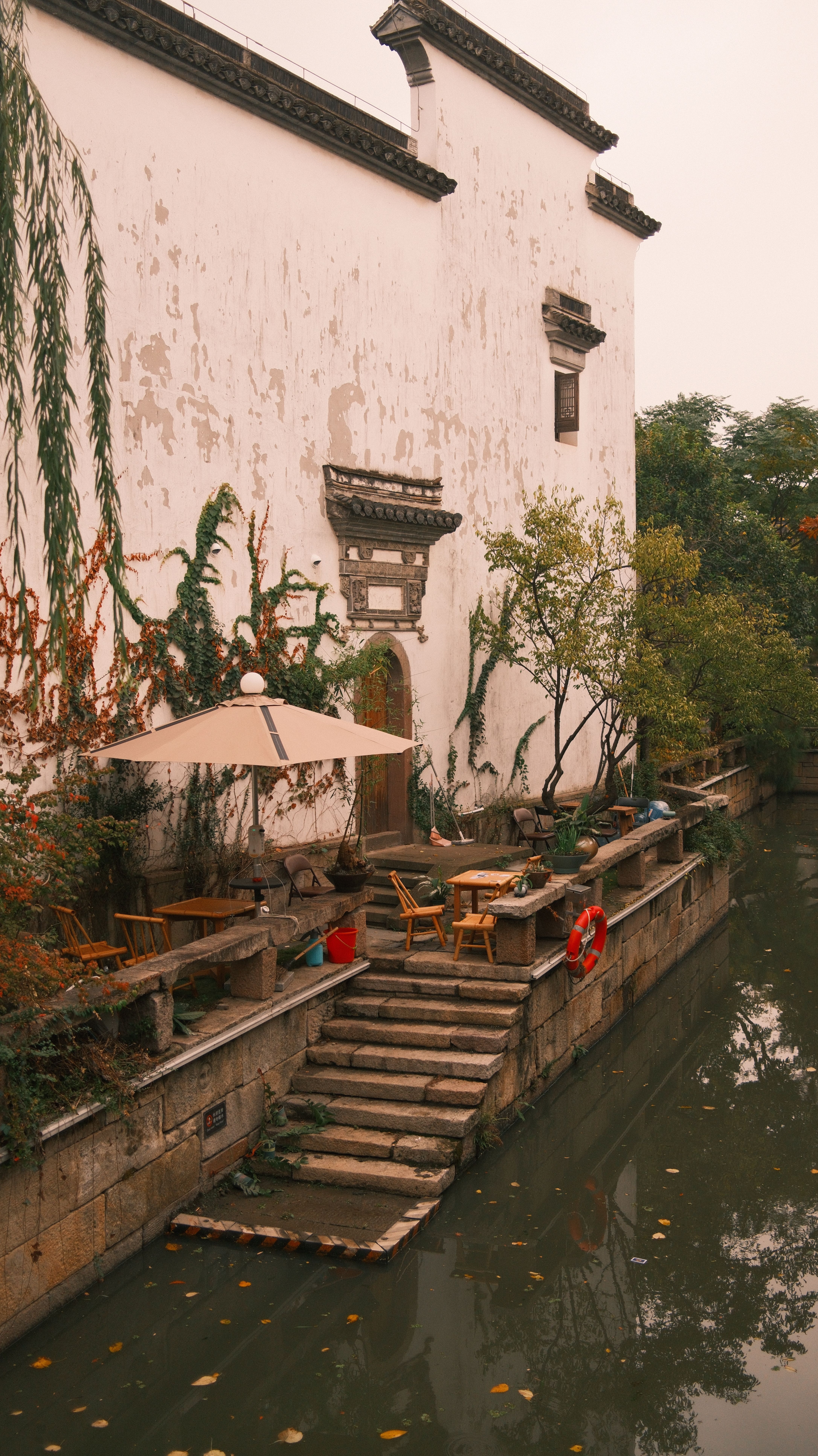 Charming Canalside Cafe in Historic Asian Setting · Free Stock Photo