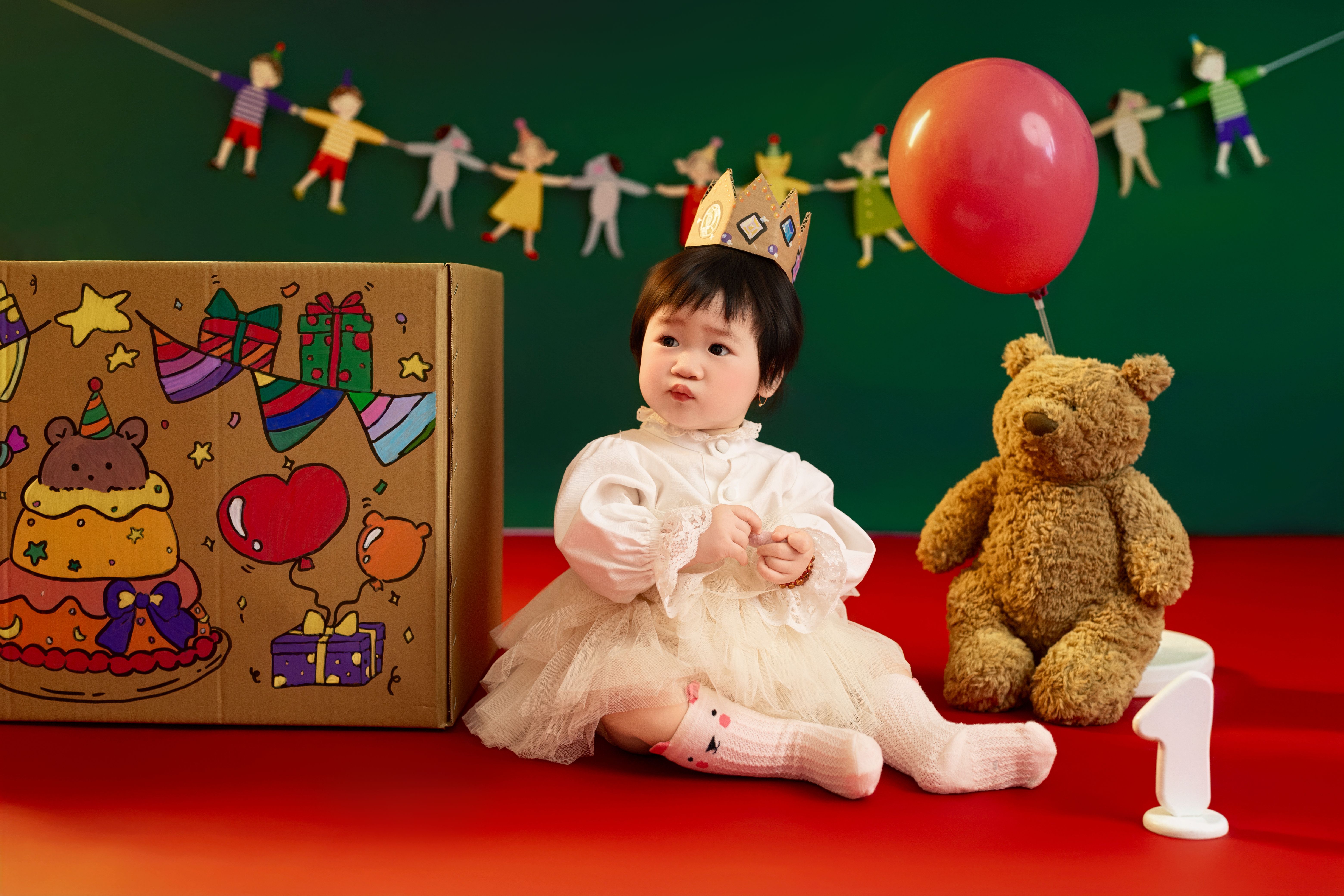 Adorable Baby Celebrating First Birthday in Studio · Free Stock Photo