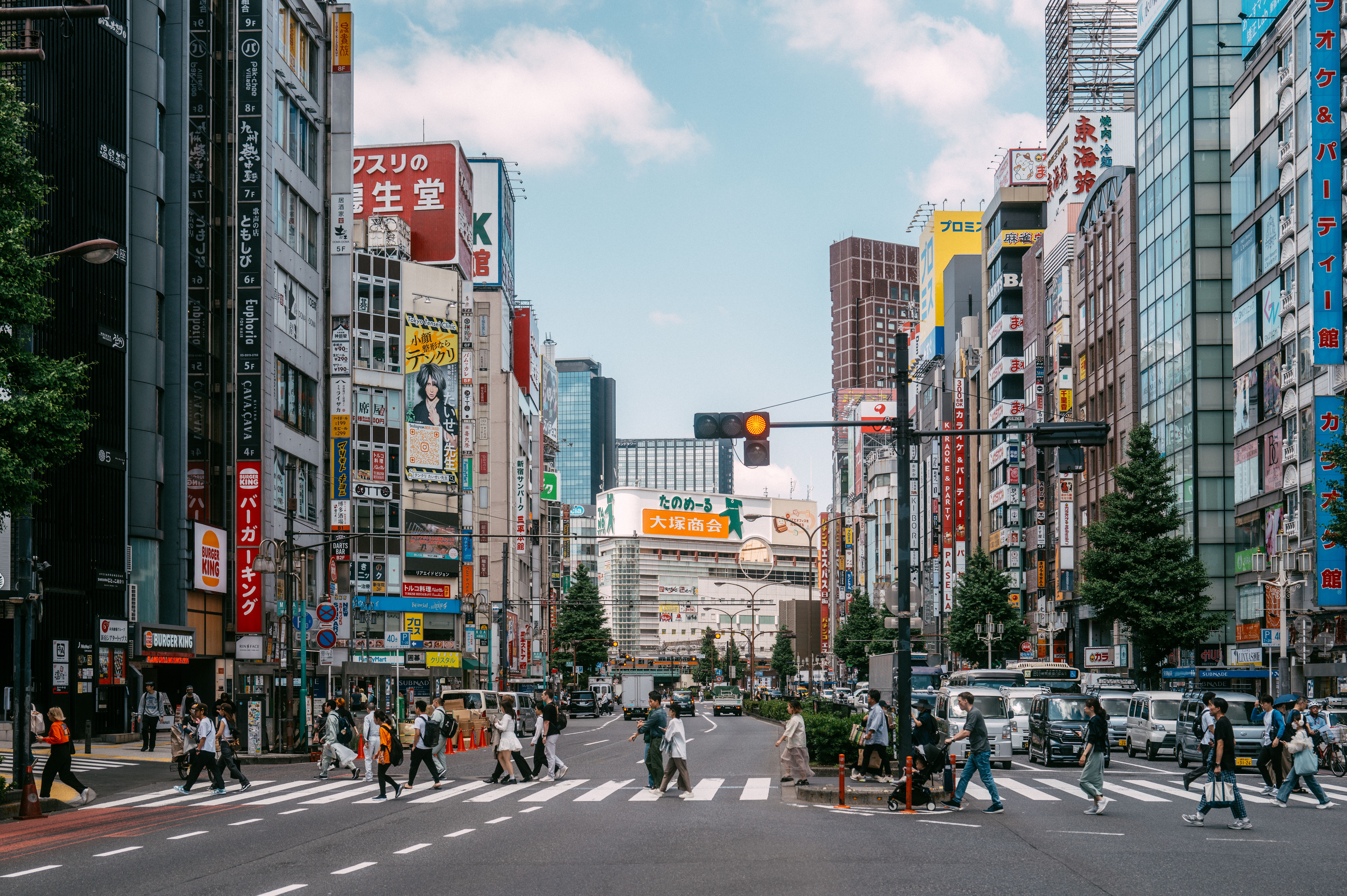 Bustling Tokyo Street Scene with Busy Crosswalk · Free Stock Photo