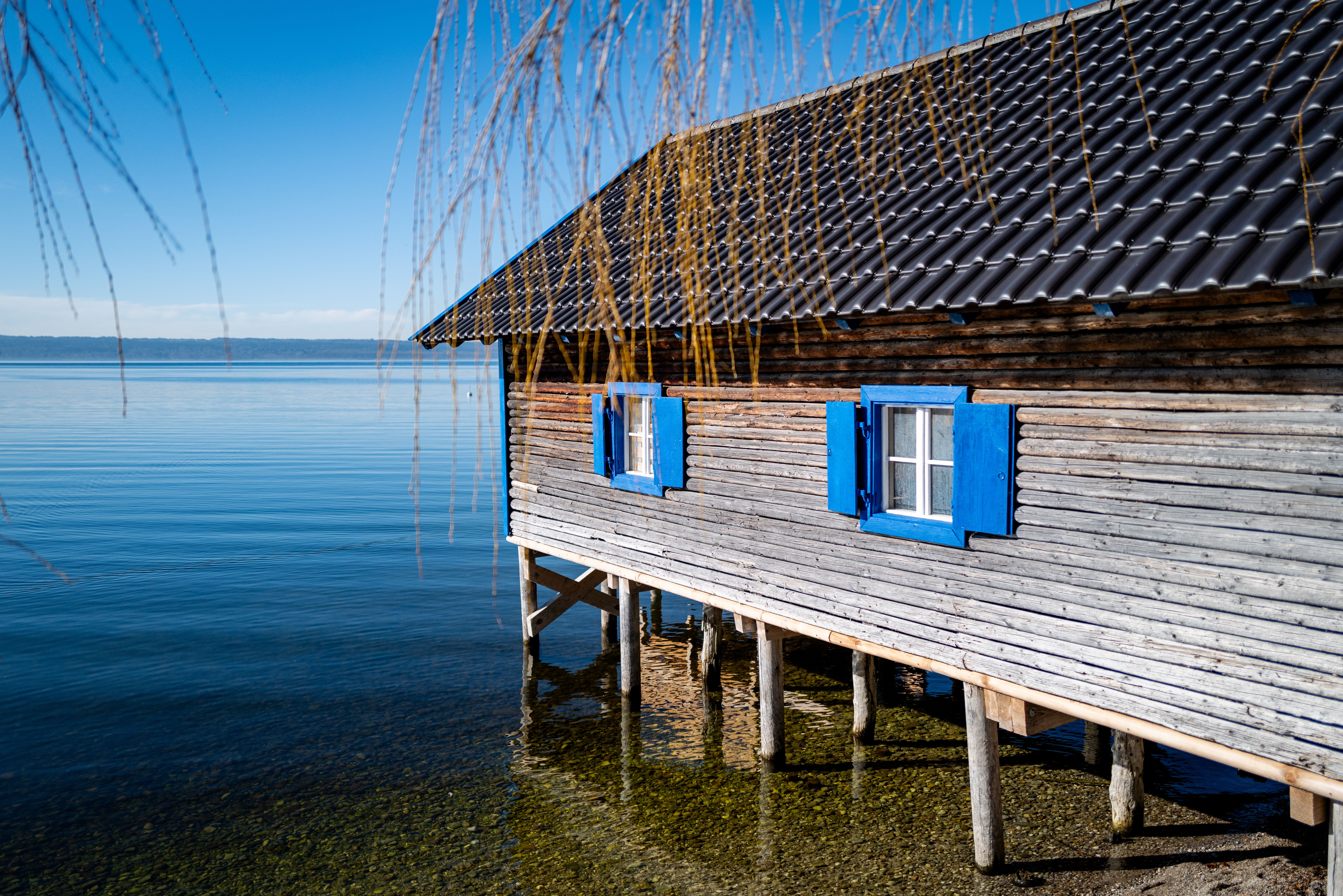Rustic Lakefront Cabin with Blue Accents · Free Stock Photo