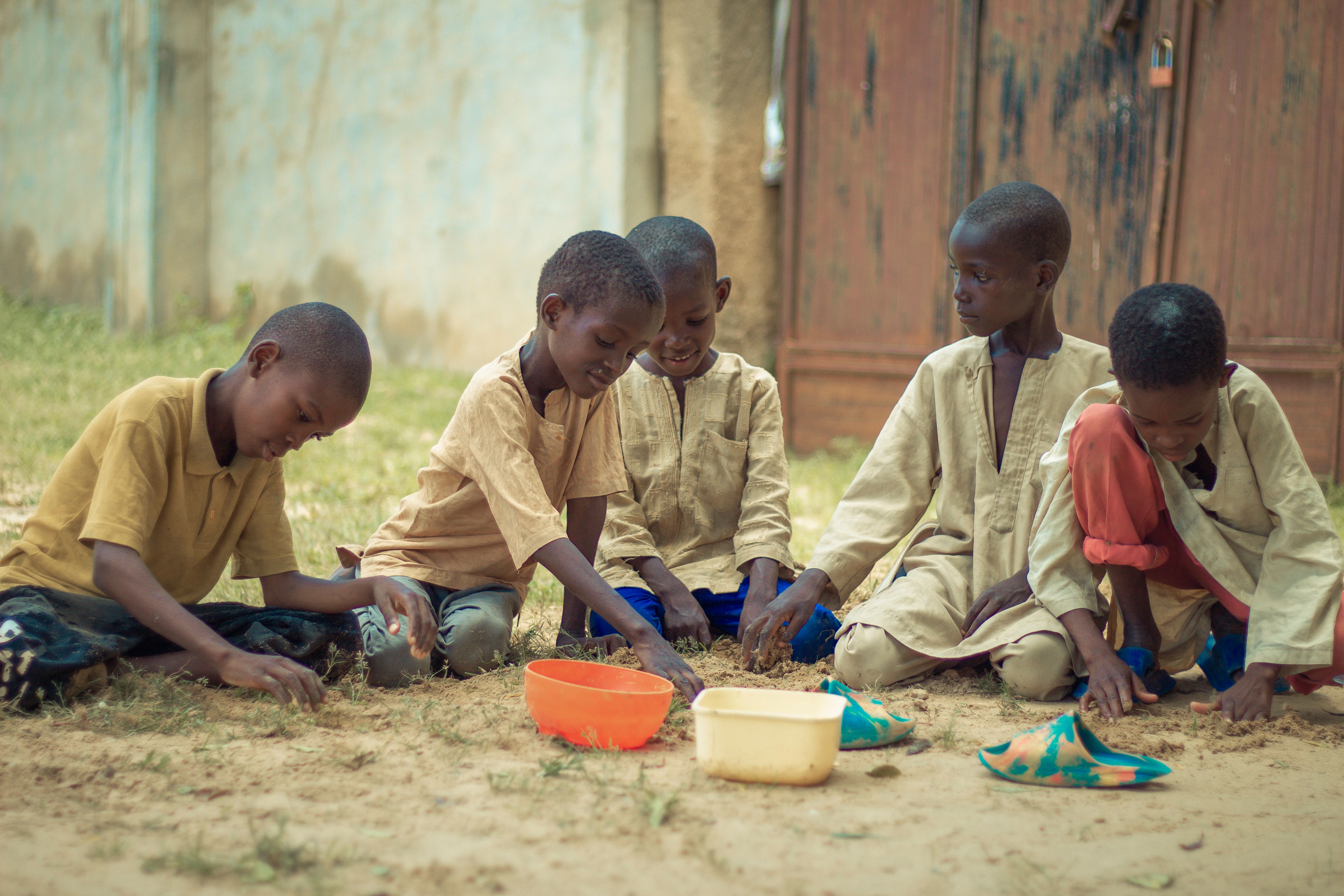 Children Sharing a Meal in African Community · Free Stock Photo