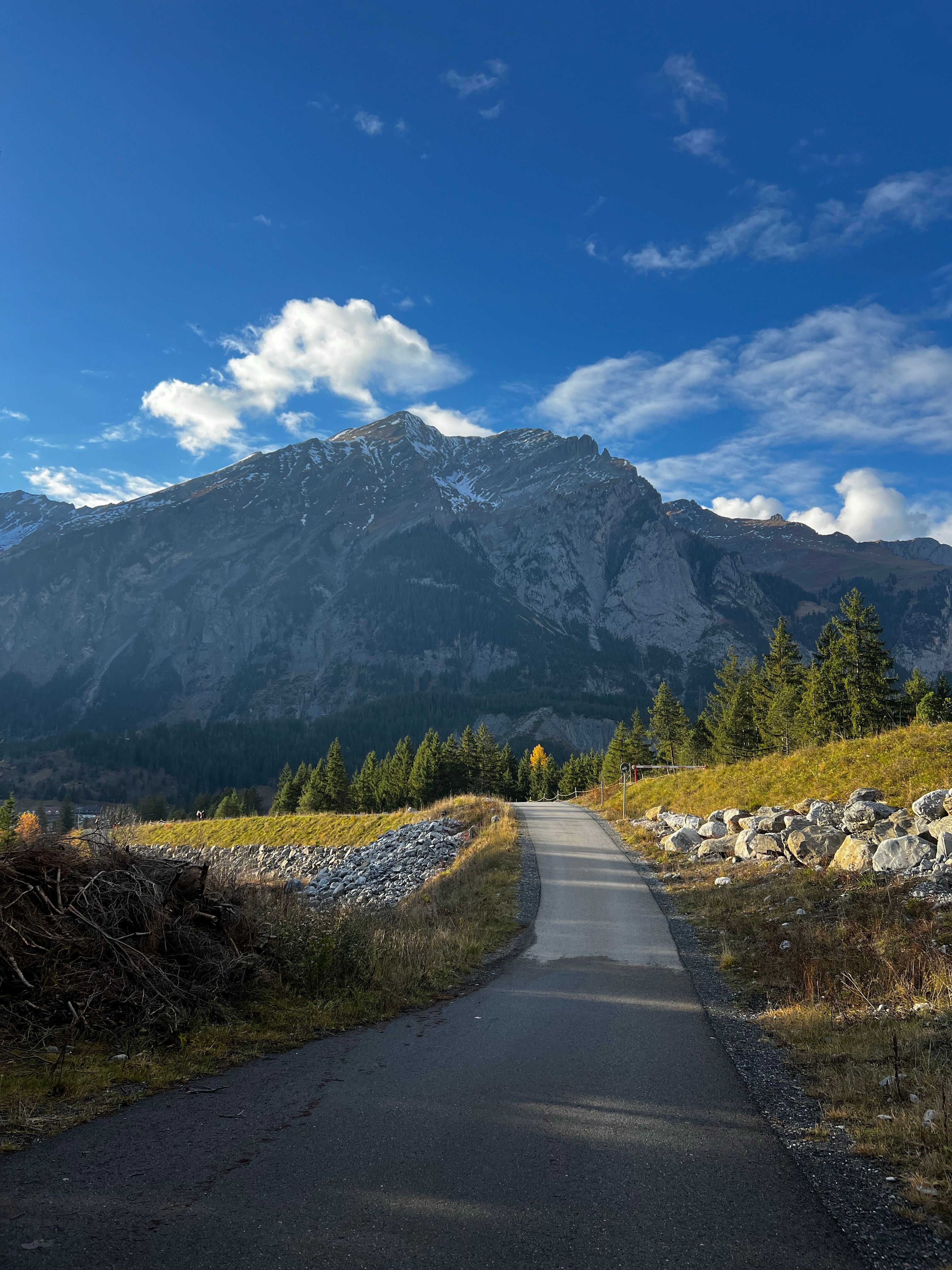 Scenic Mountain Pathway Under Blue Sky · Free Stock Photo