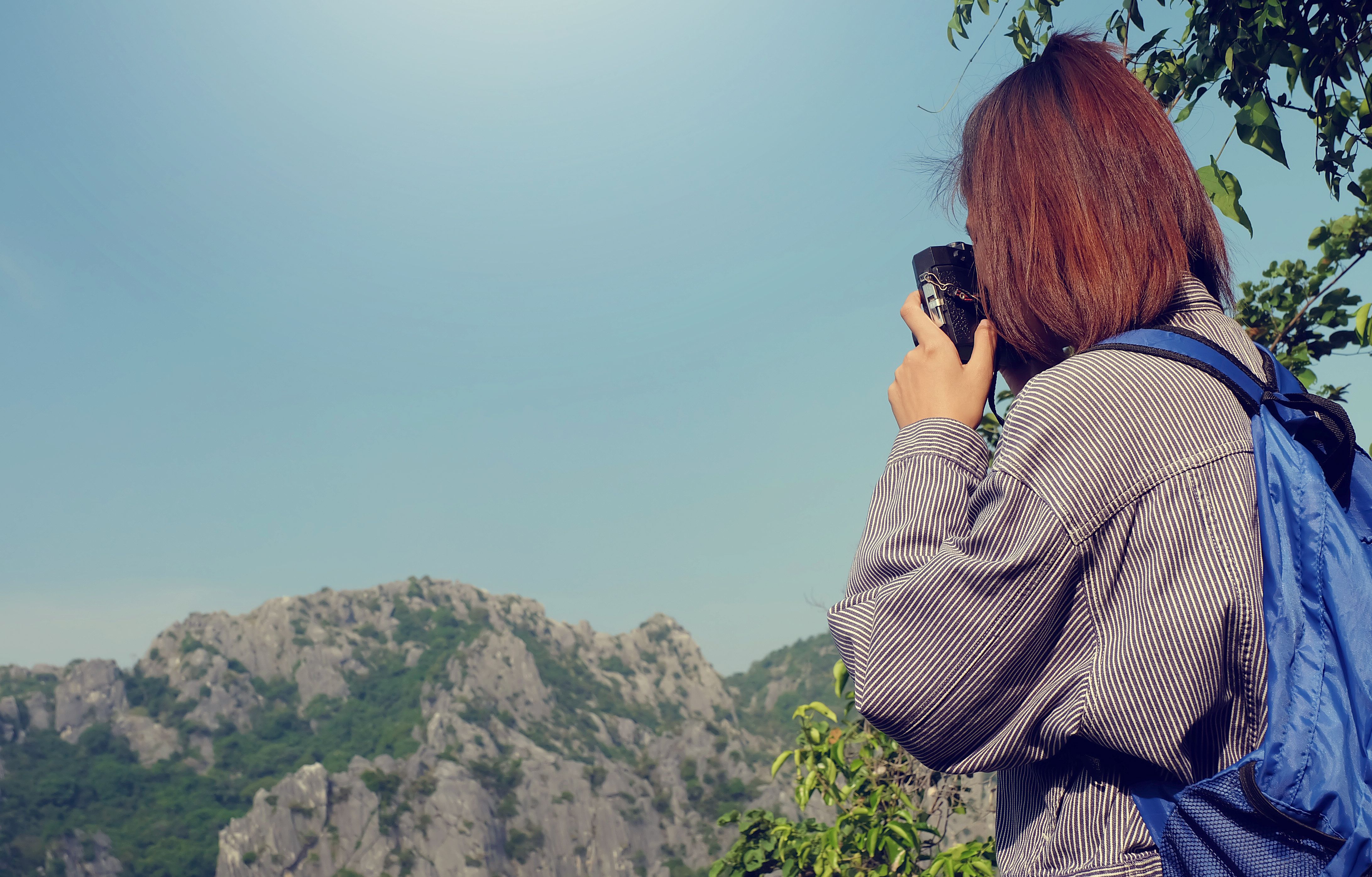 Woman Using Camera · Free Stock Photo
