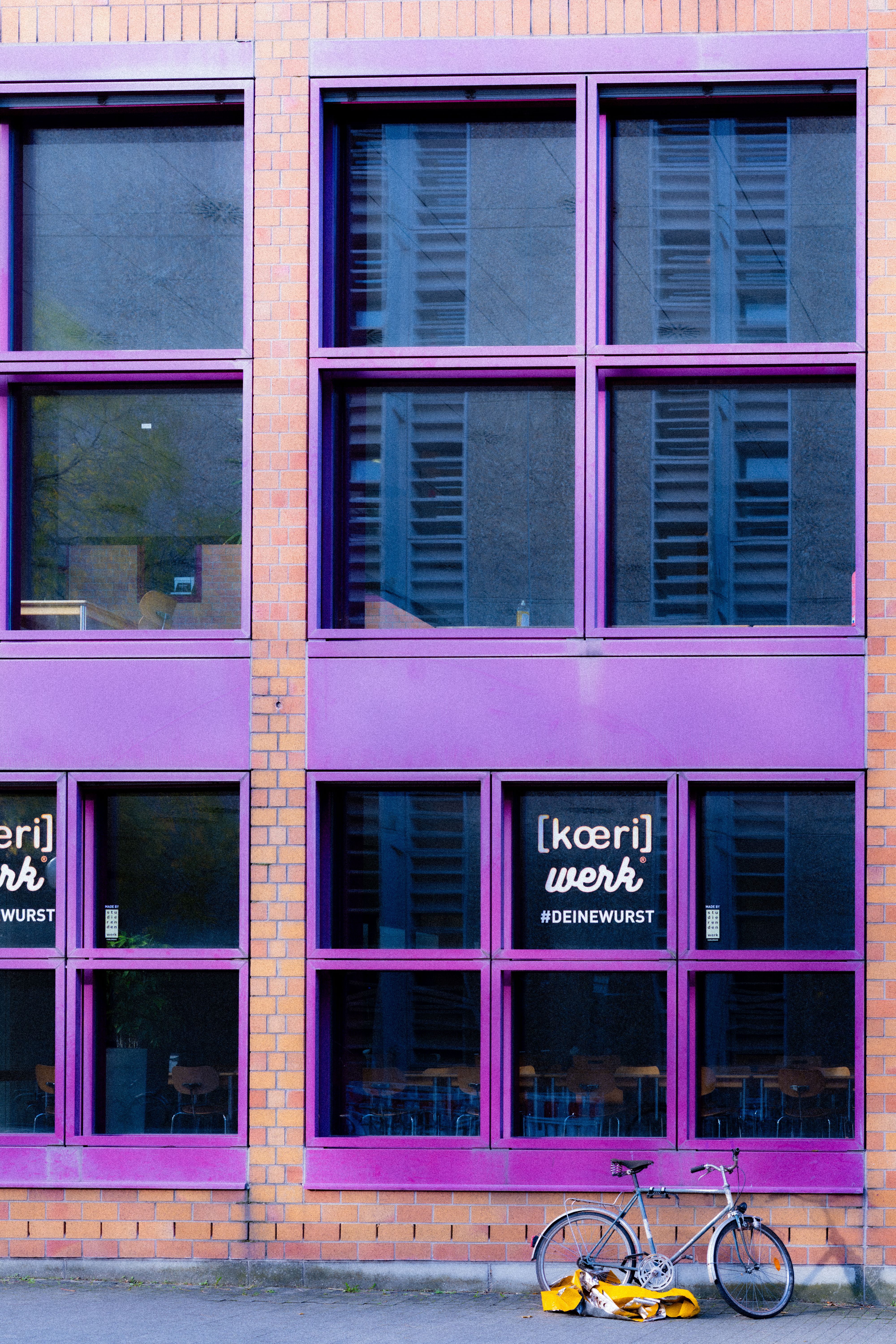 Colorful Storefront with Bicycle in Karlsruhe · Free Stock Photo