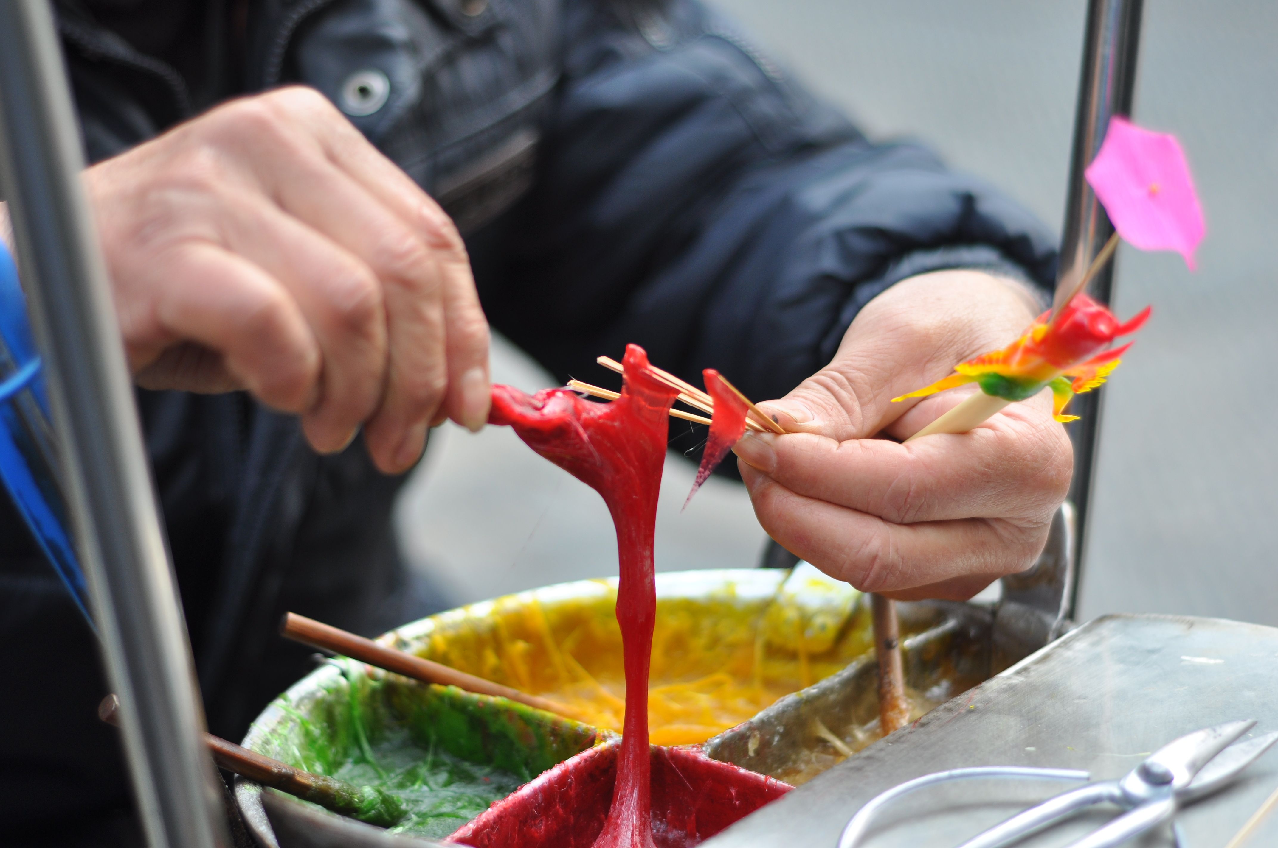 Craftsman Creating Traditional Sugar Art Sculpture · Free Stock Photo