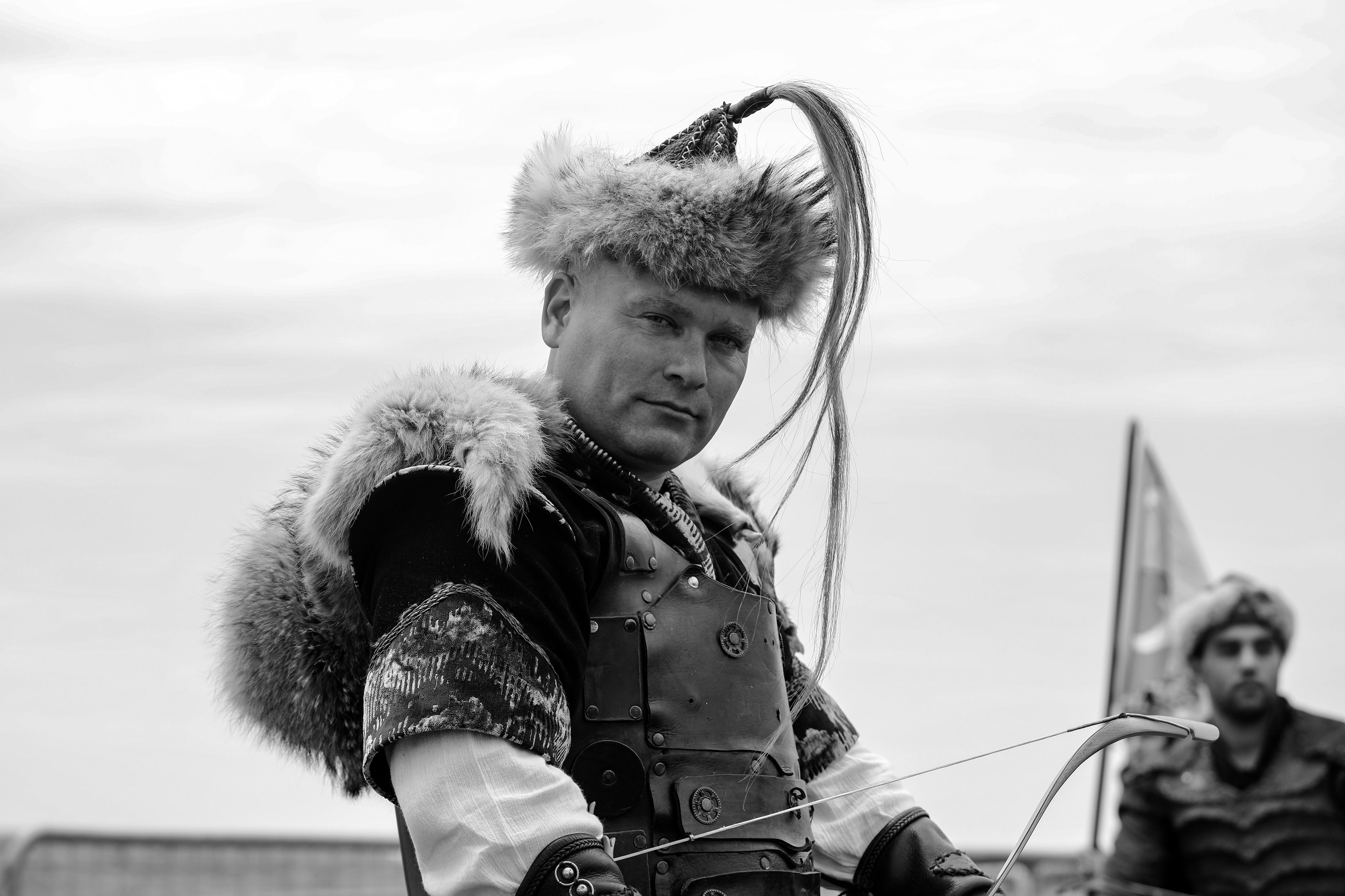 Medieval Archer in Traditional Attire with Bow · Free Stock Photo