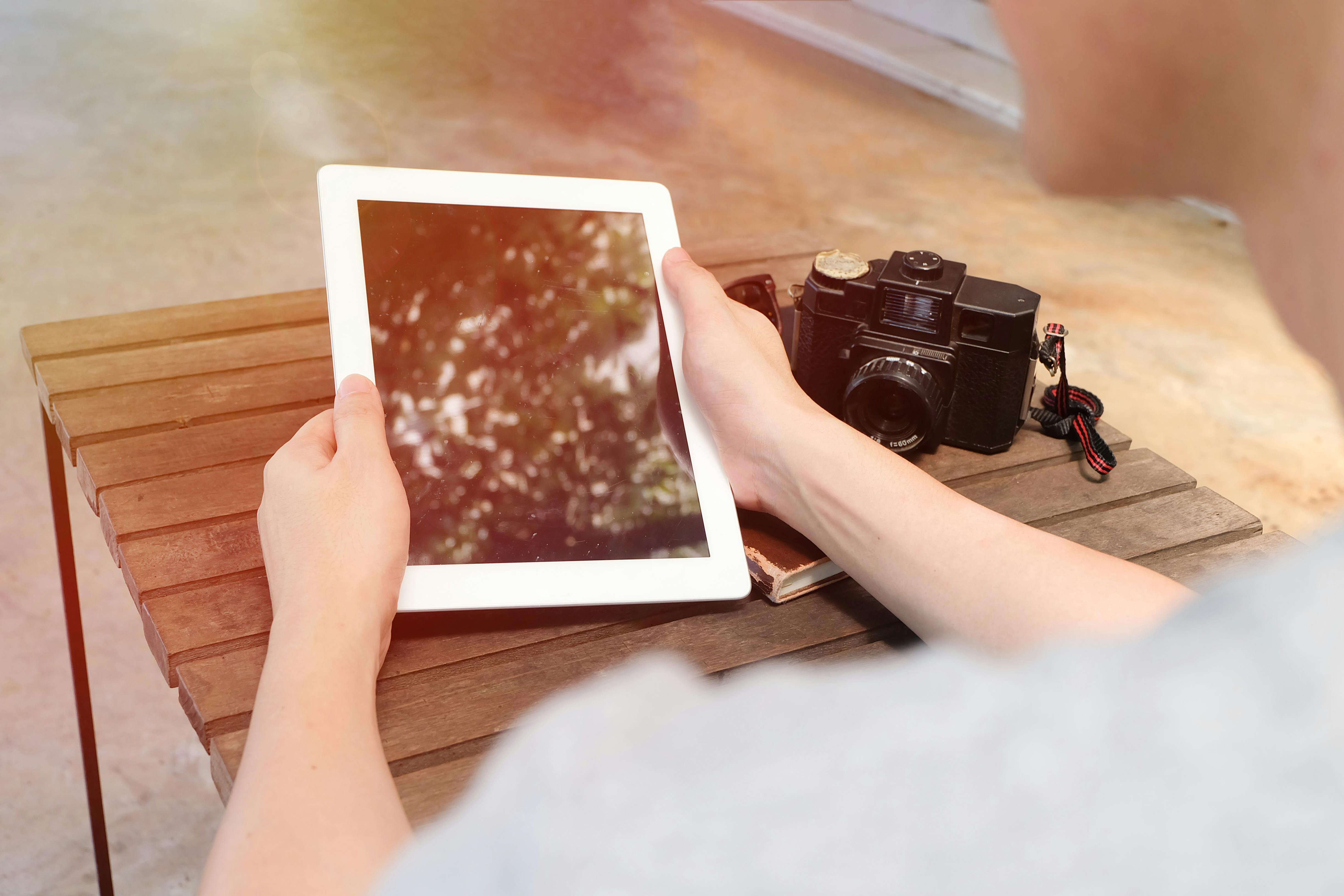 Person Holding White Ipad · Free Stock Photo