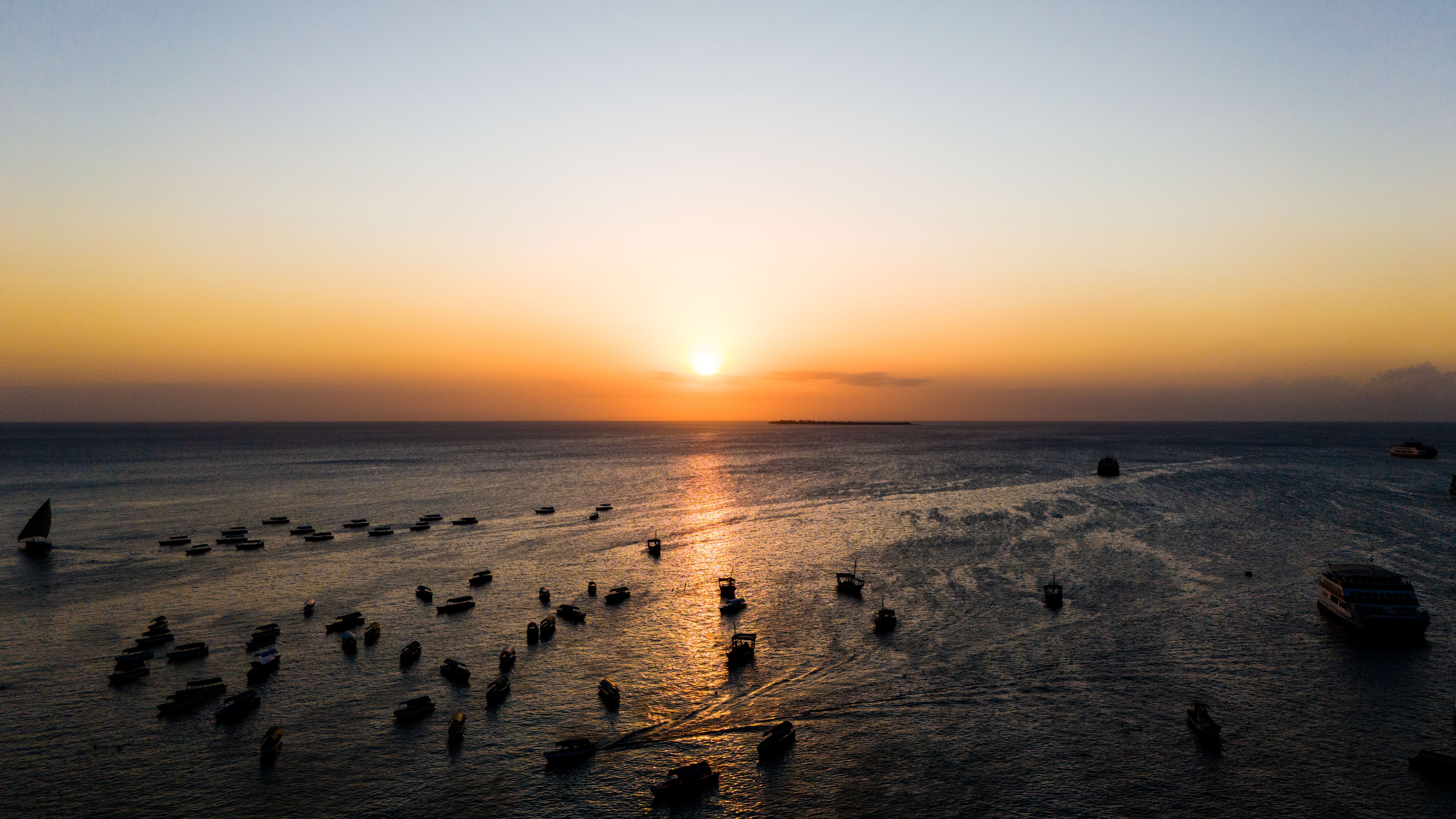 Beautiful Sunset Over Zanzibar's Stone Town Waters · Free Stock Photo