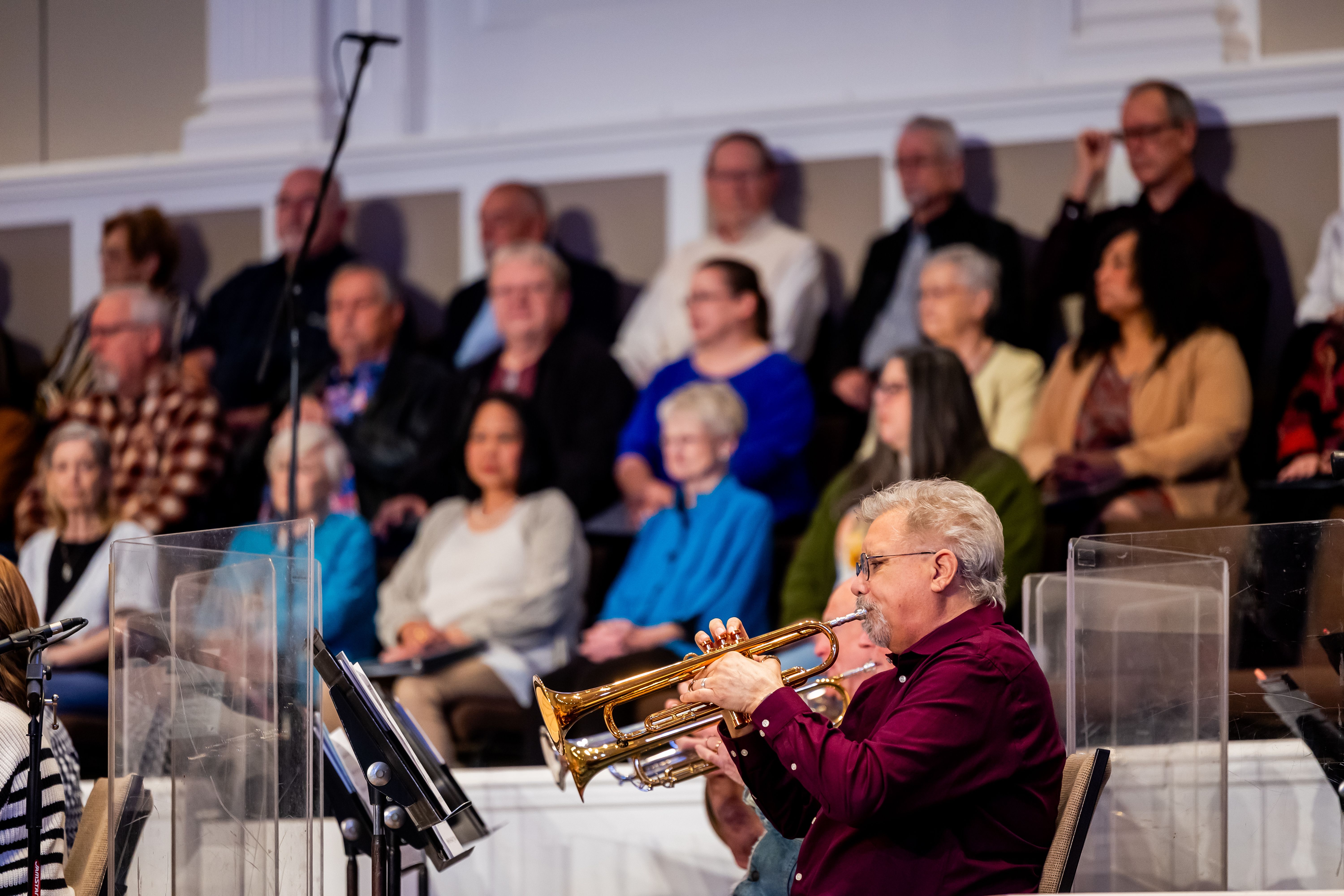 Musician Performing Trumpet at Indoor Concert · Free Stock Photo