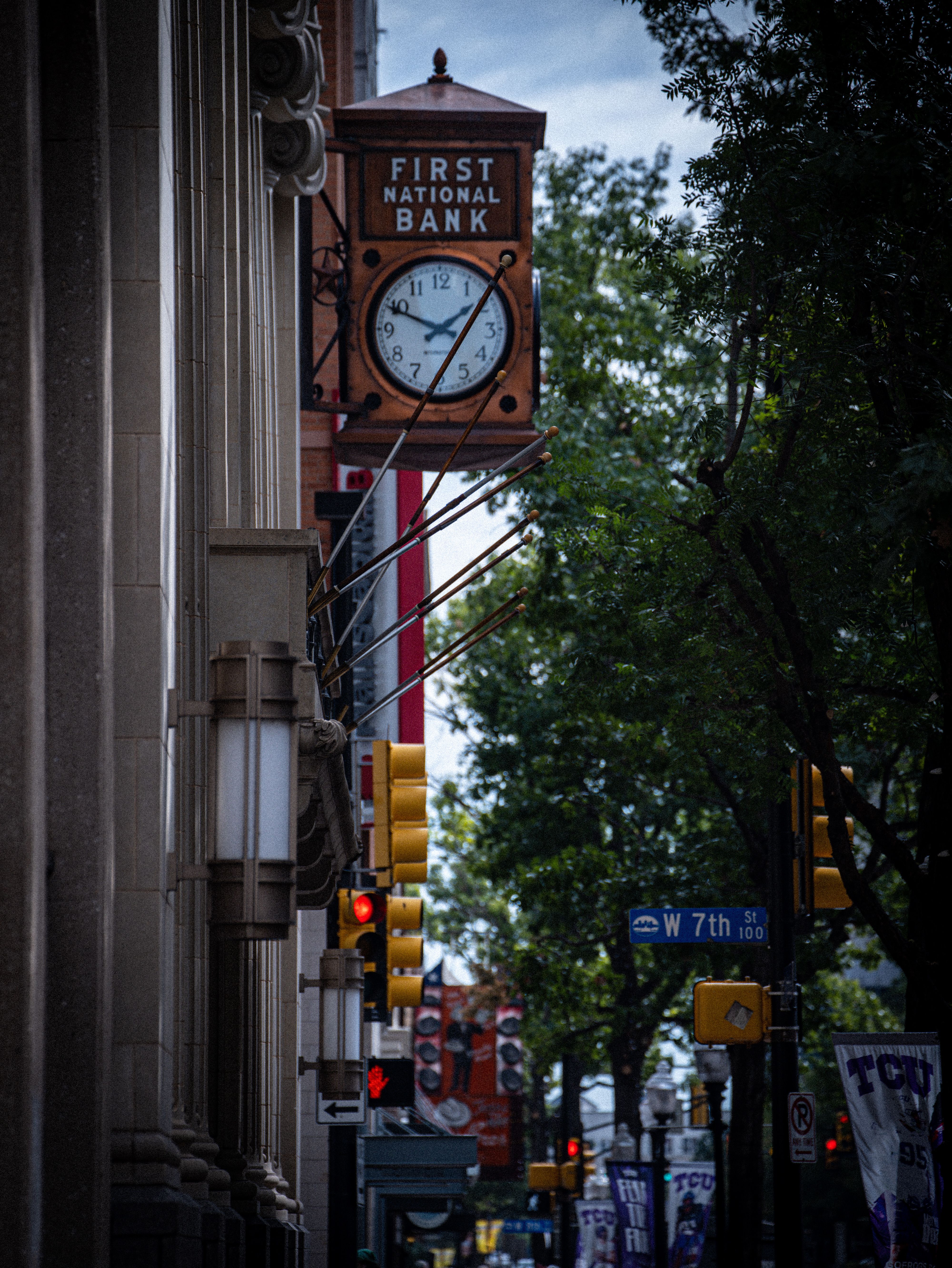 Vintage First National Bank Clock on Urban Street · Free Stock Photo
