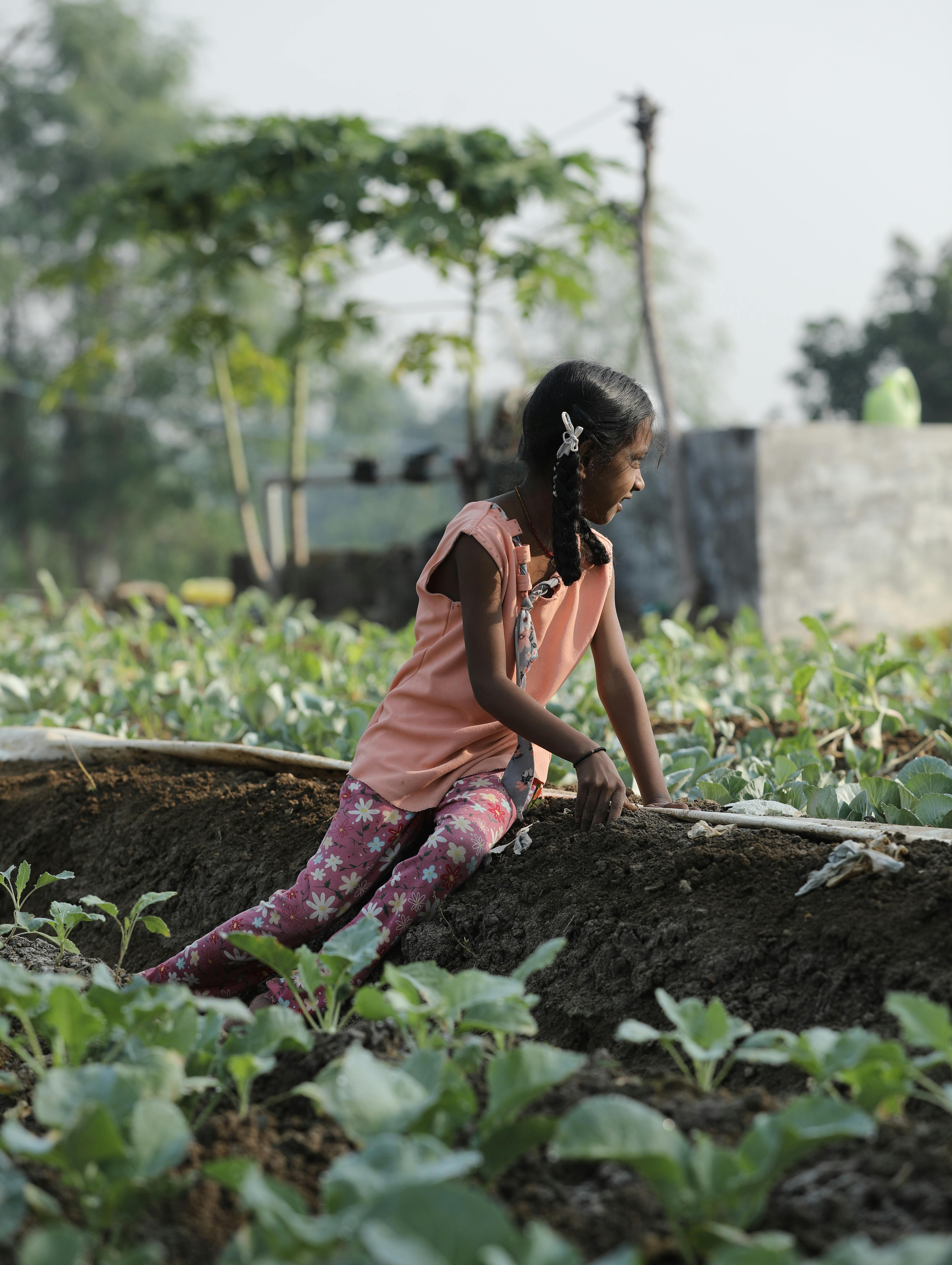 Young Girl Enjoying Rural Farm Life · Free Stock Photo