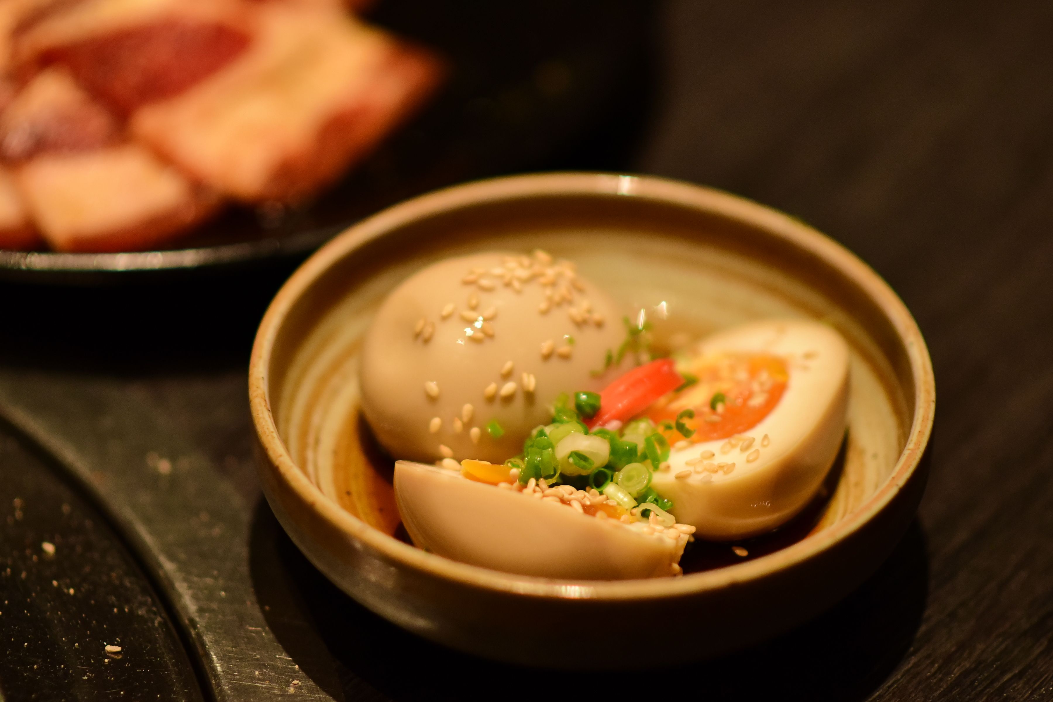 Japanese Ramen Topping with Seasoned Eggs and Sesame · Free Stock Photo