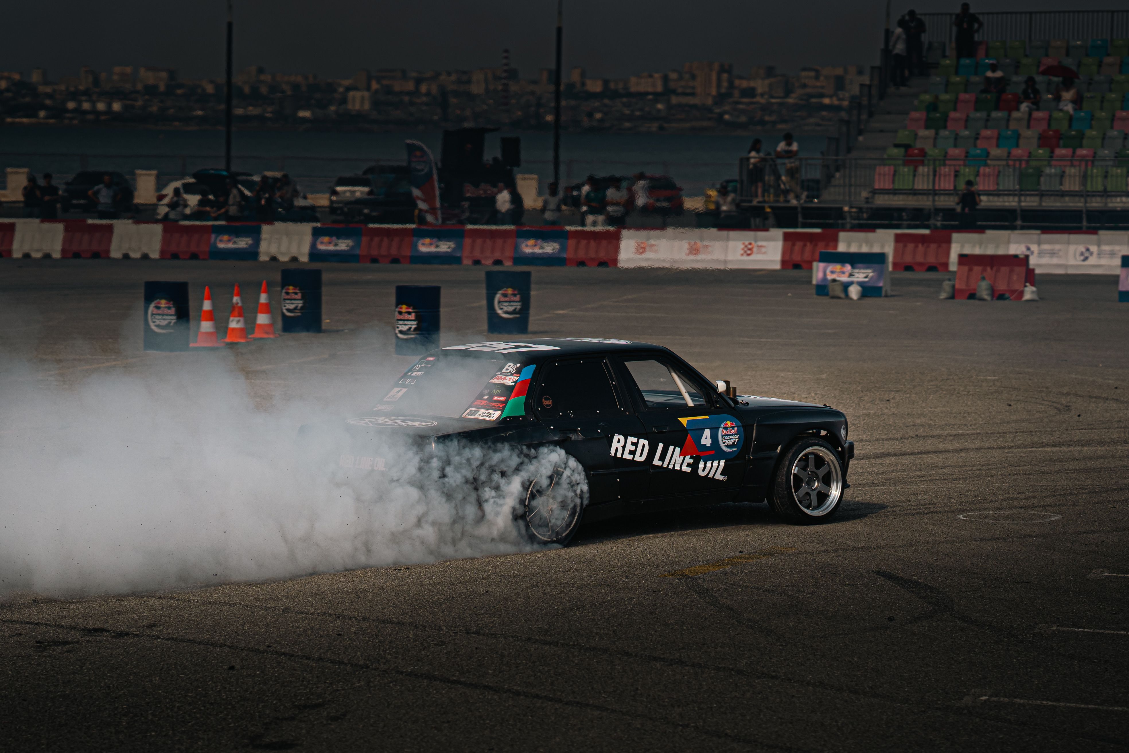 Exciting Car Drift in Urban Racing Event · Free Stock Photo