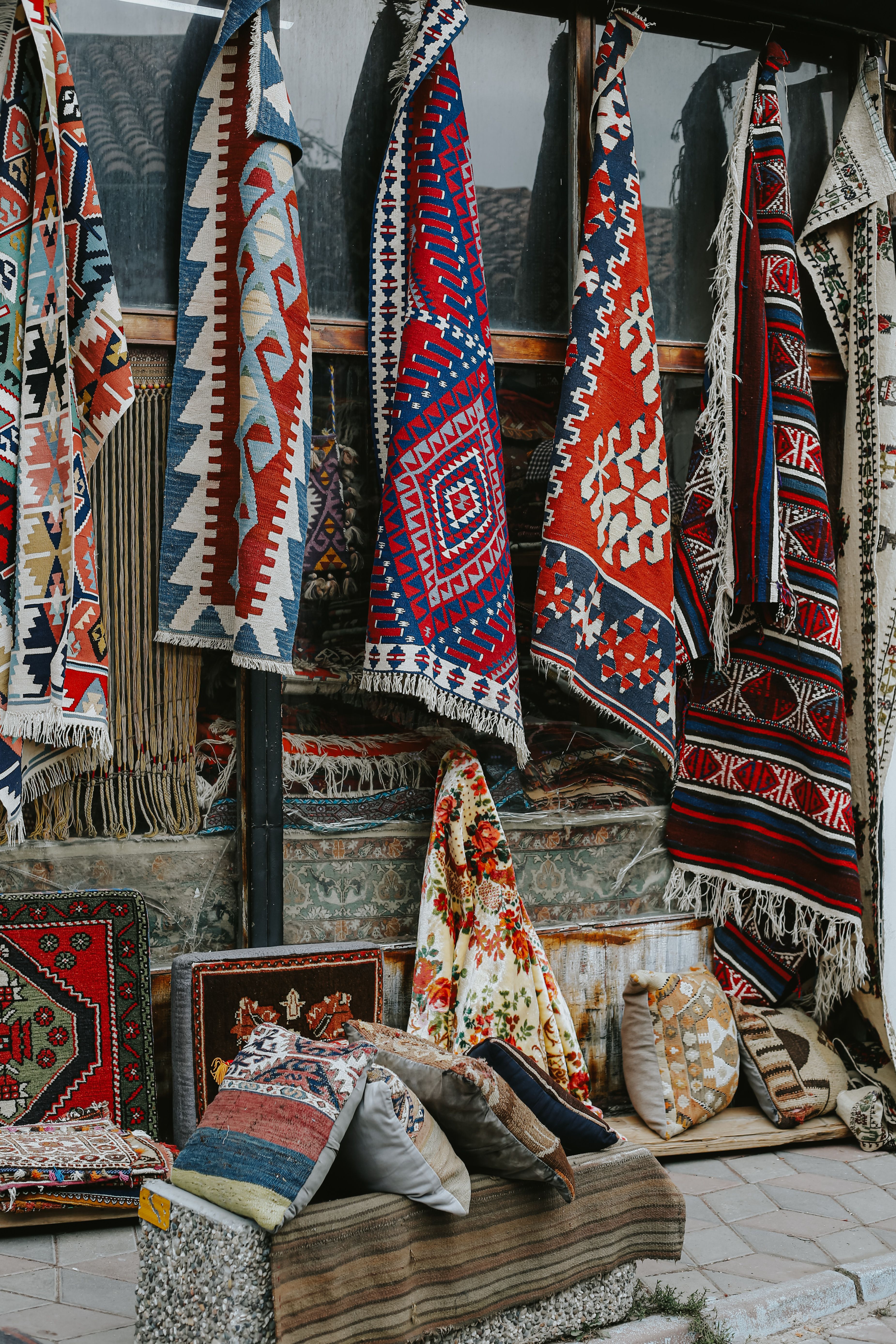 Colorful Traditional Rugs Display Outdoor Market · Free Stock Photo