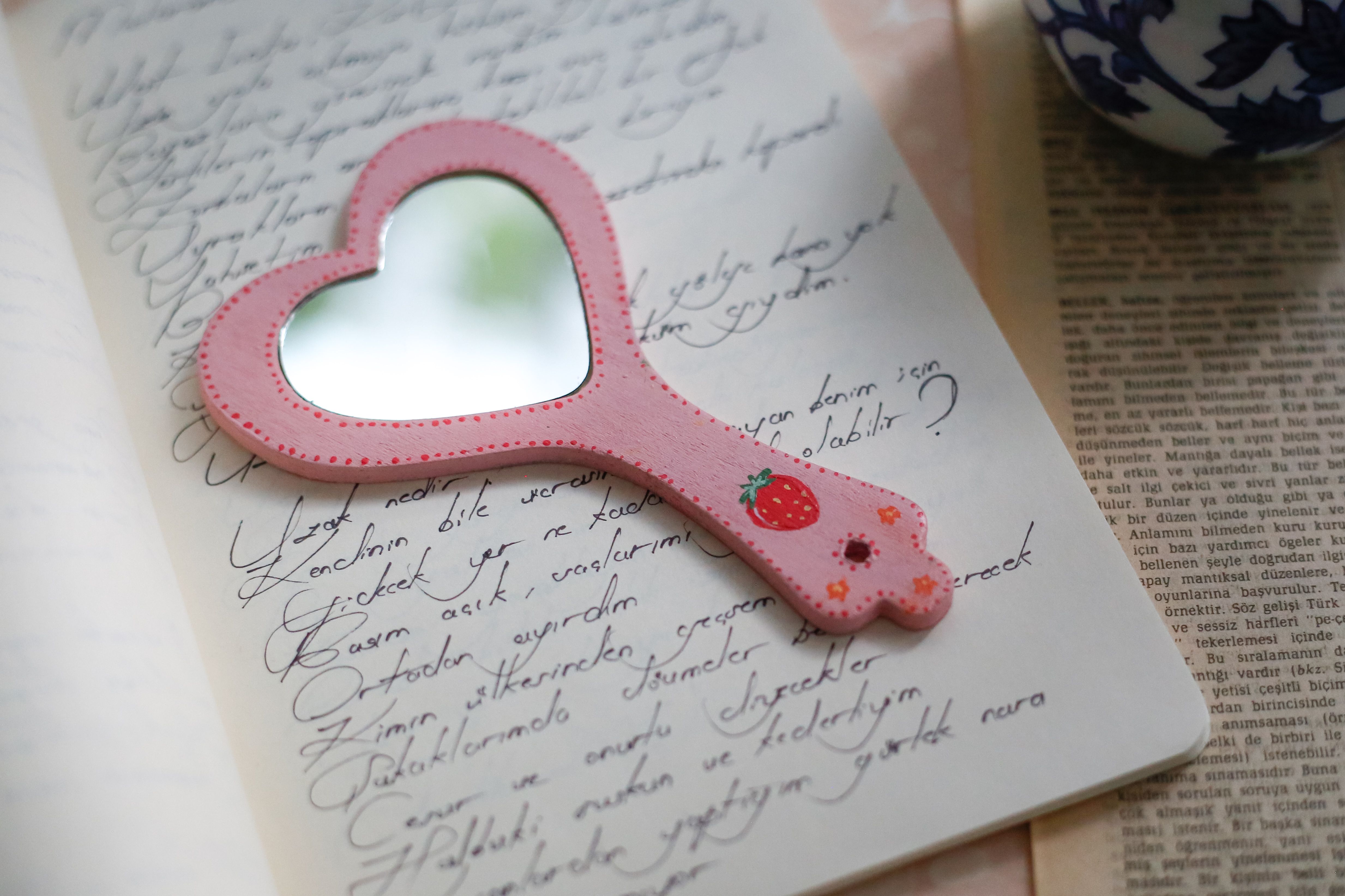 Heart-shaped Mirror on Handwritten Journal · Free Stock Photo