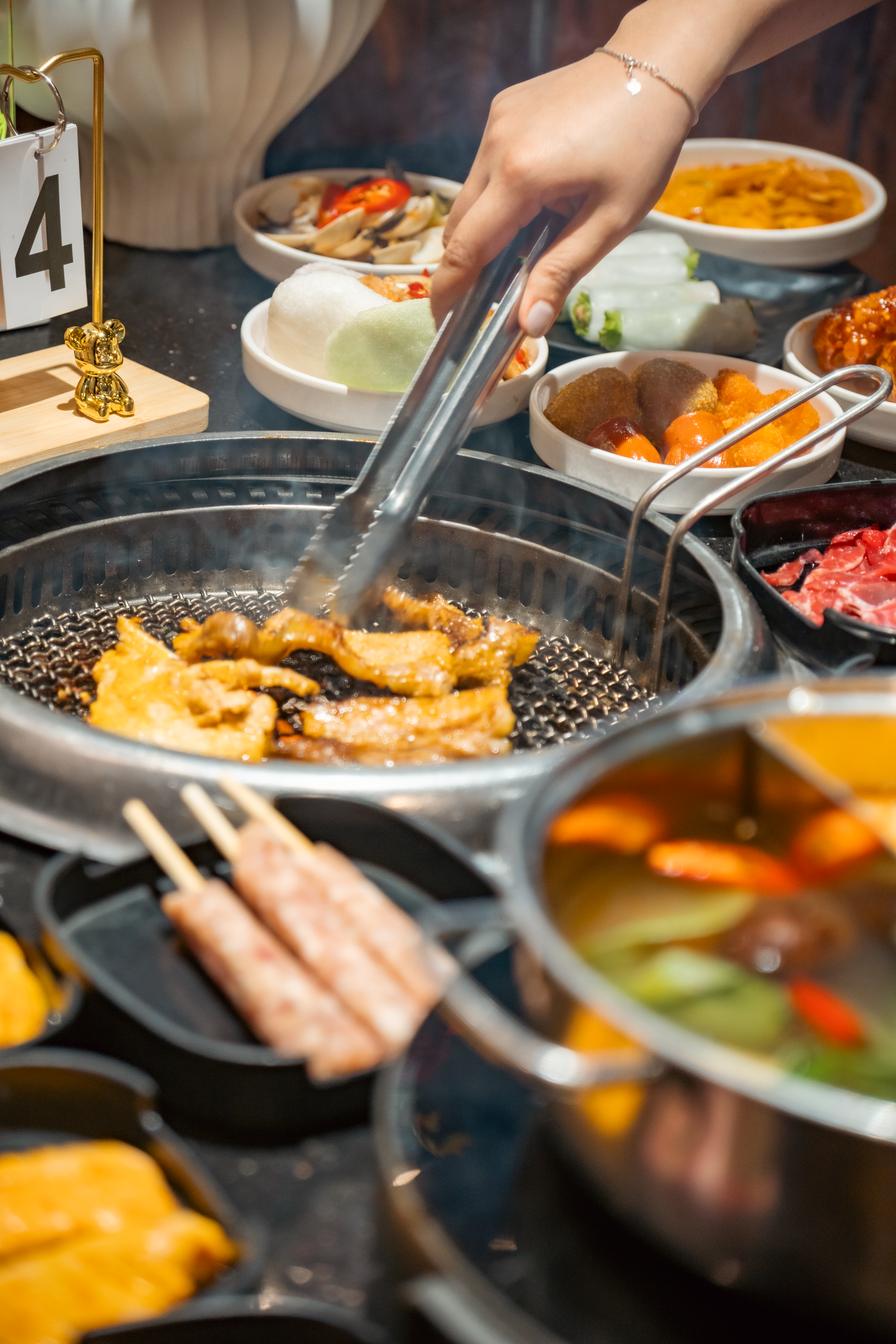 Authentic Indoor Korean BBQ Dining Experience · Free Stock Photo
