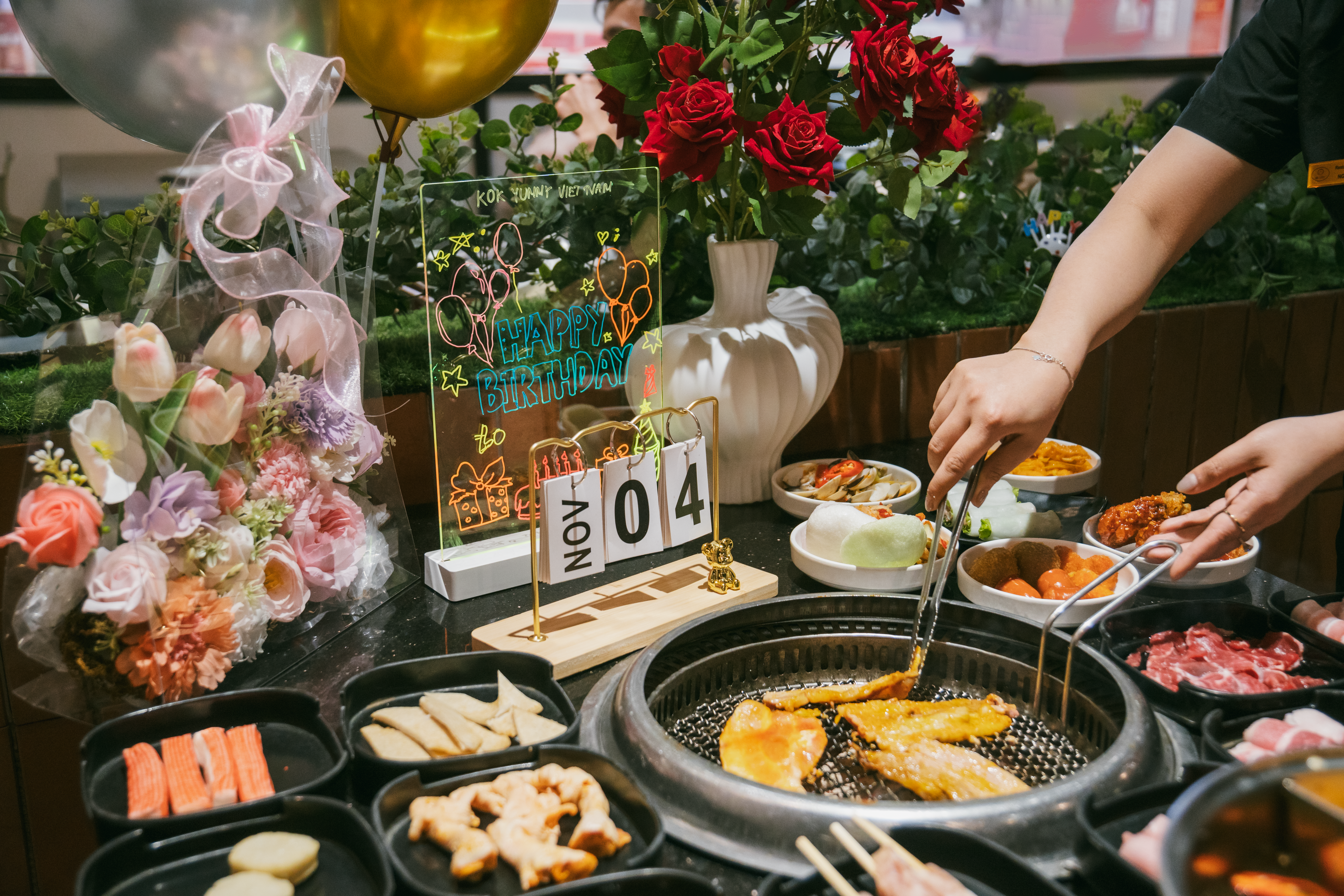 Vibrant Vietnamese Birthday BBQ Celebration · Free Stock Photo