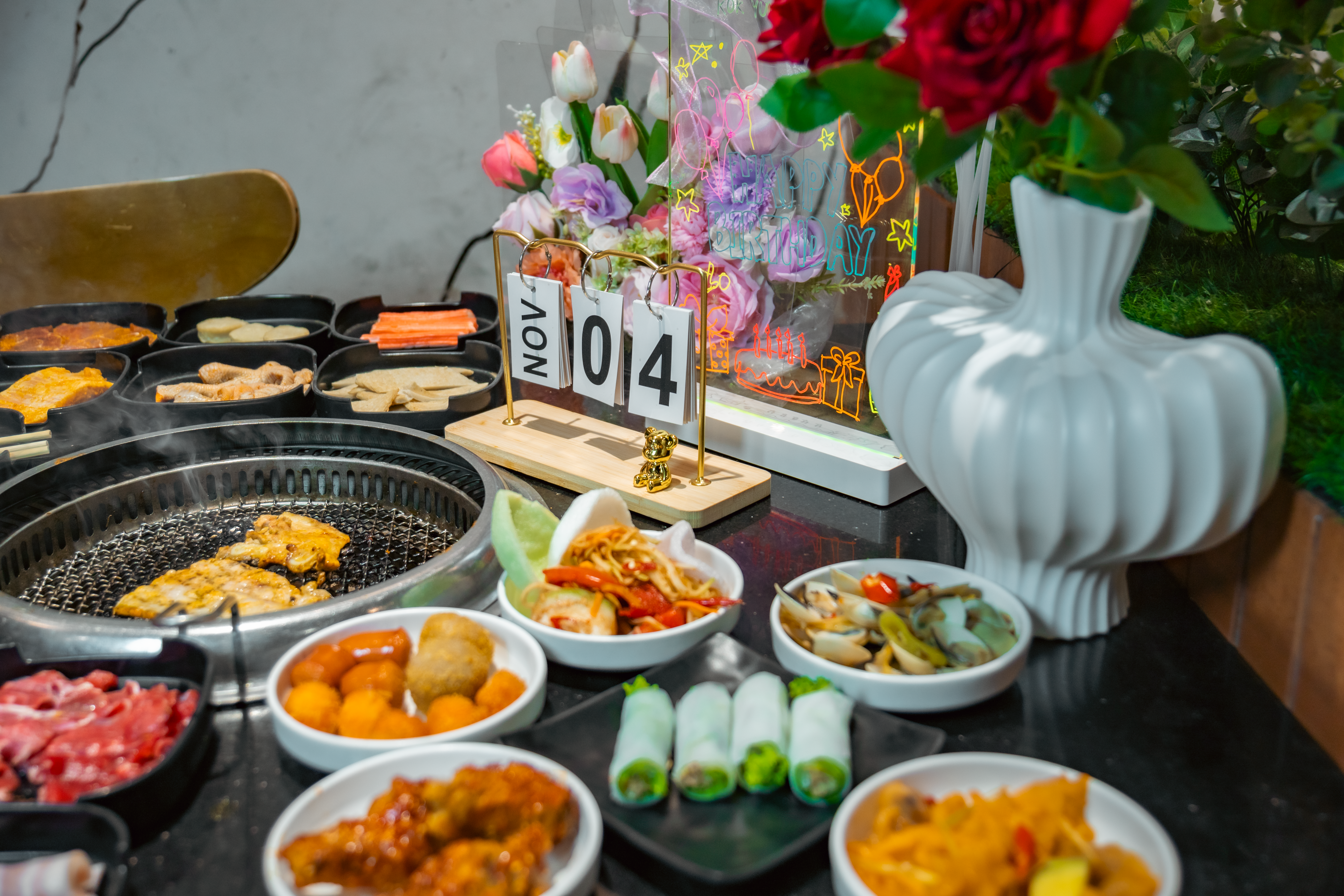 Delicious Asian BBQ with Varied Dishes · Free Stock Photo