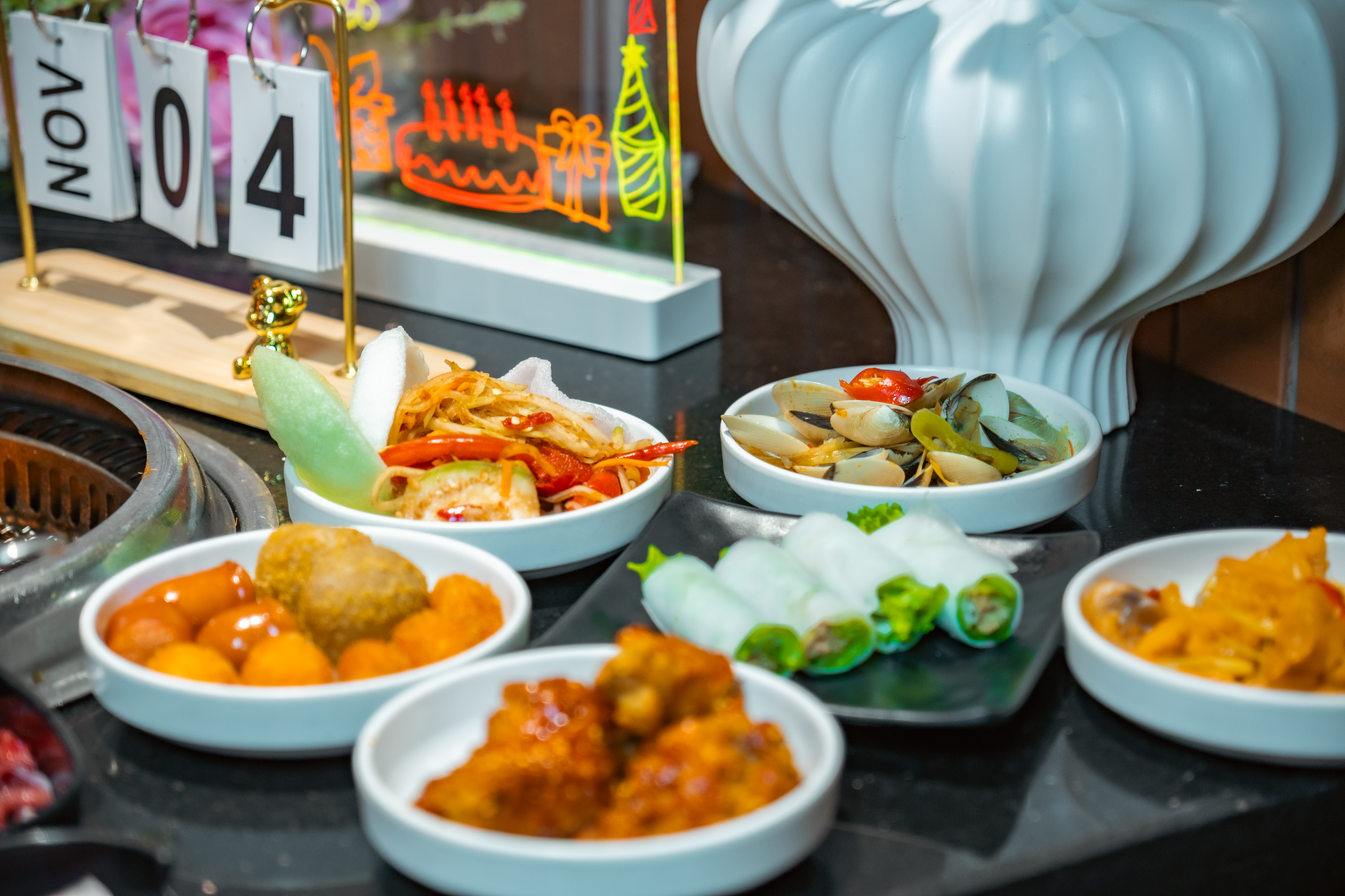 Colorful Vietnamese Dishes on a Table Setting · Free Stock Photo