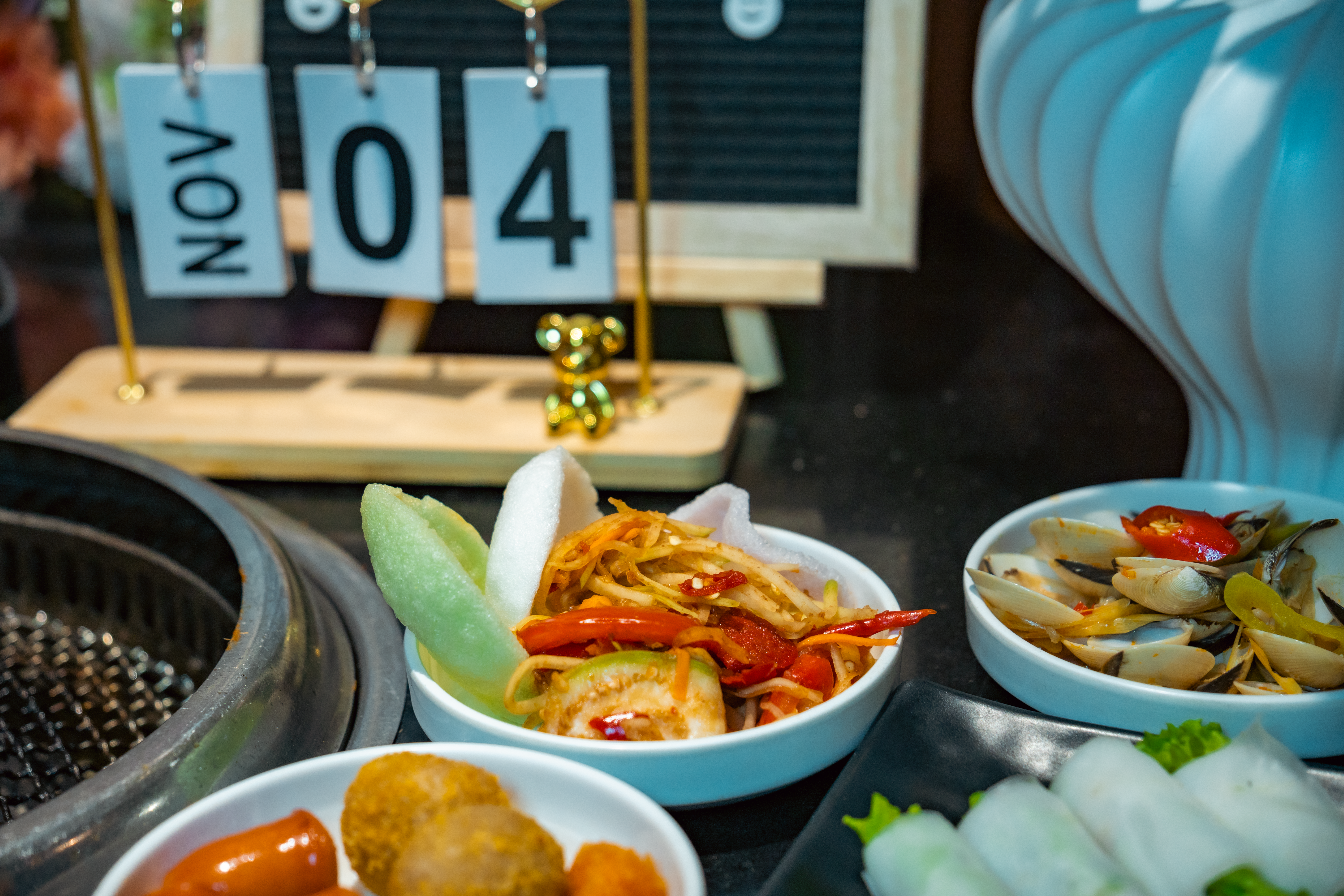 Colorful Vietnamese Cuisine Display on Dining Table · Free Stock Photo