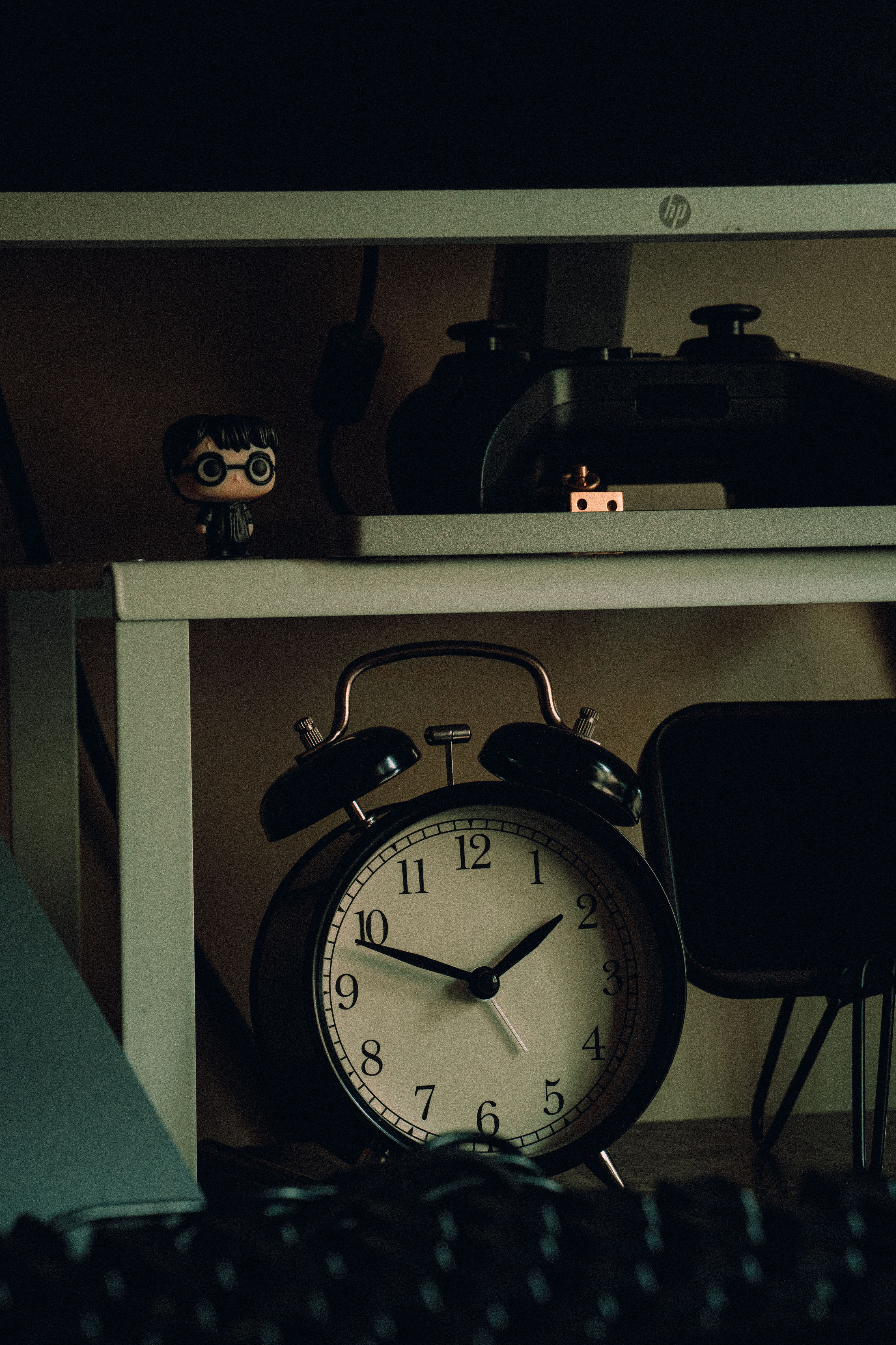 Cozy Home Workspace with Vintage Alarm Clock · Free Stock Photo