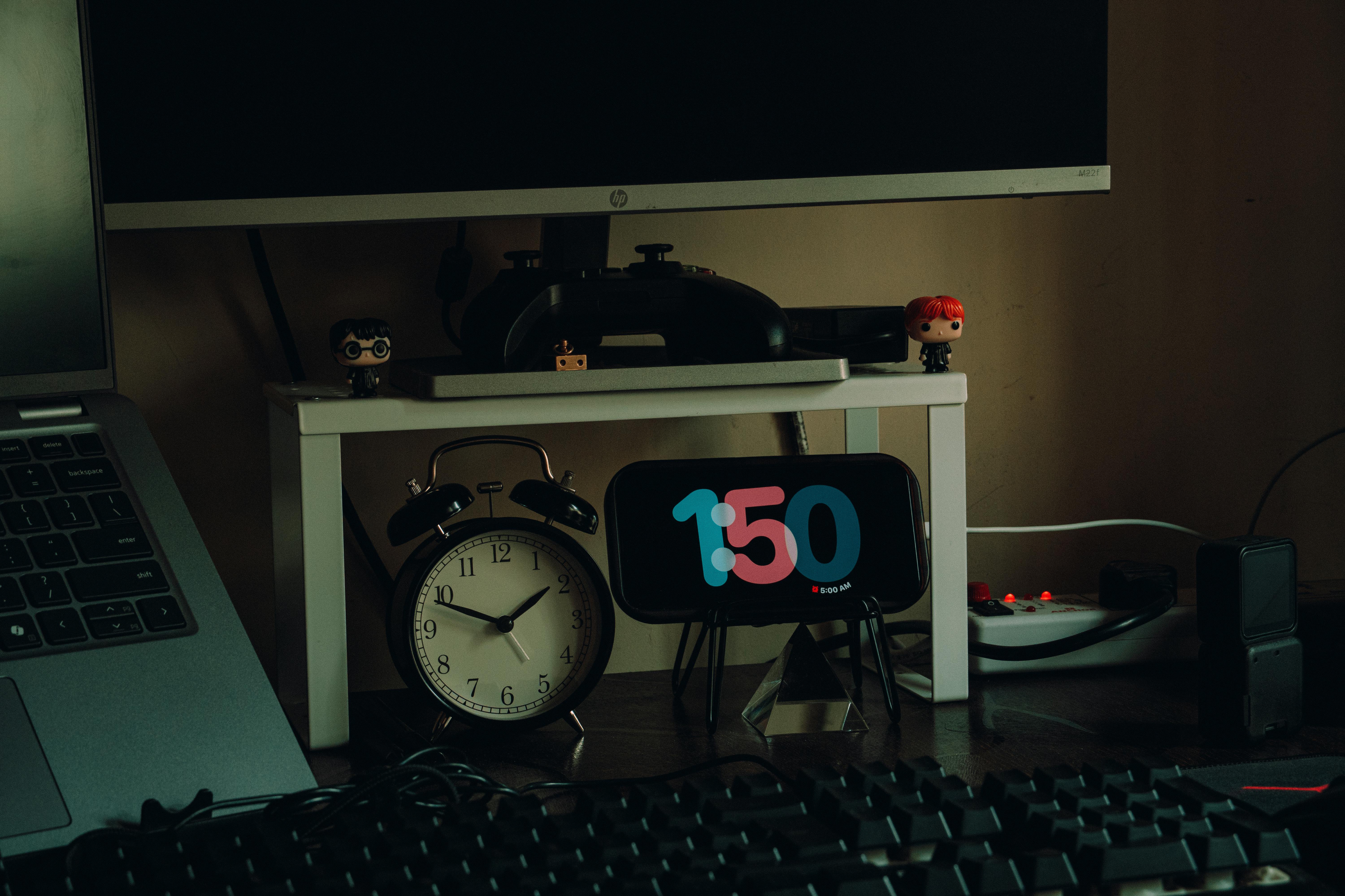 Modern Home Workspace with Desktop Setup and Clocks · Free Stock Photo