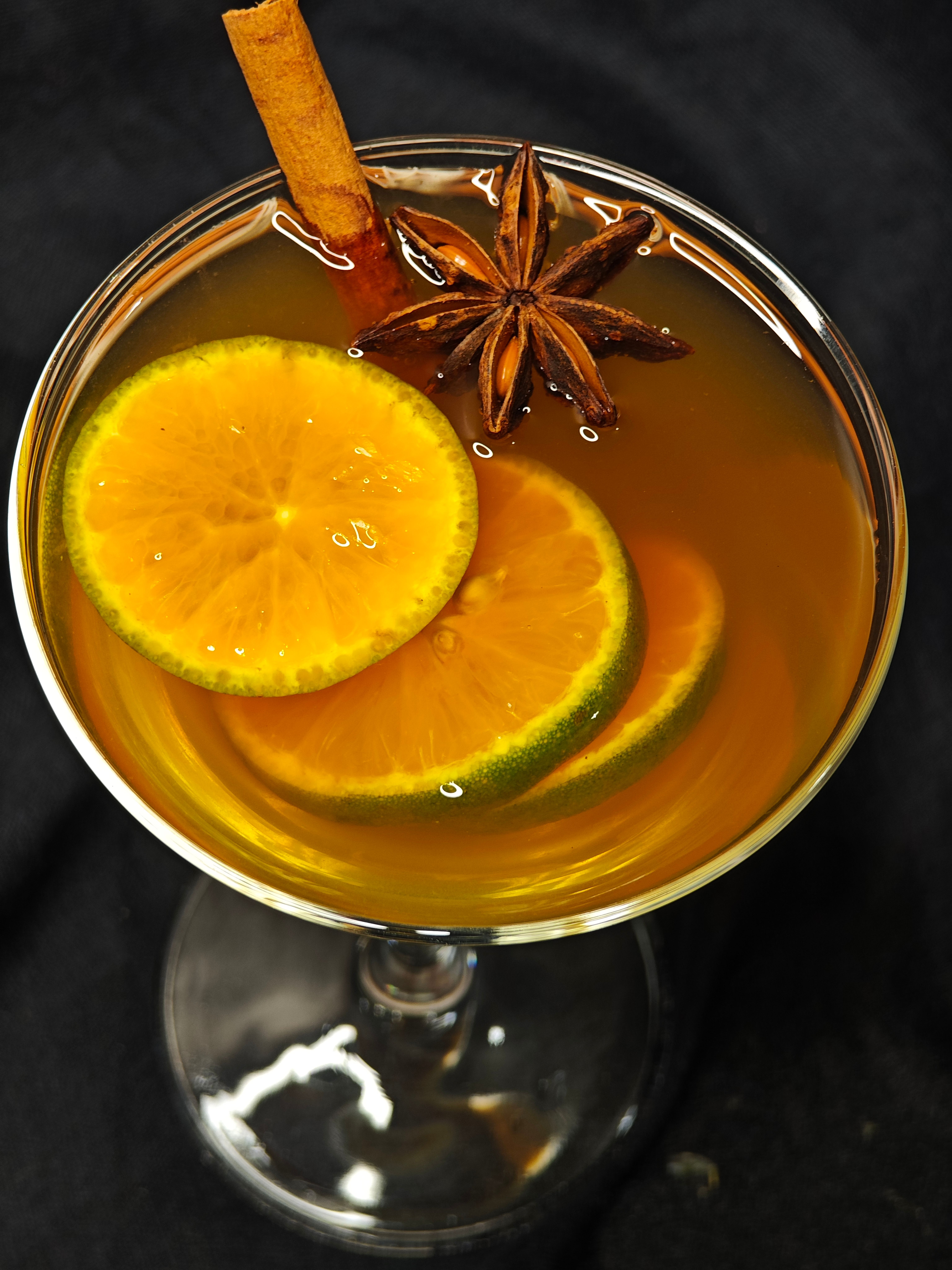 Elegant Cocktail with Citrus and Star Anise Garnish · Free Stock Photo