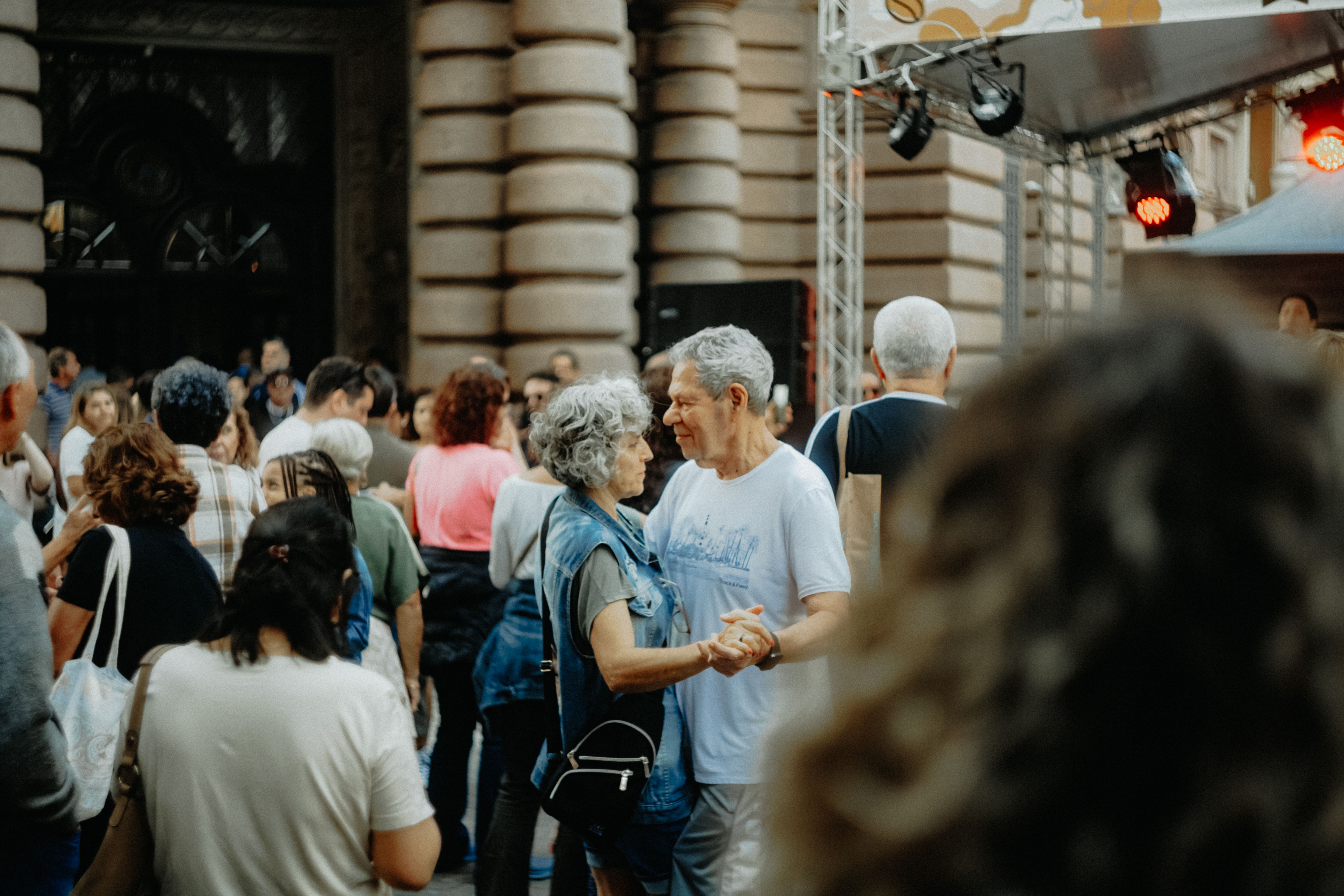 Elderly Couple Dancing at Outdoor Street Festival · Free Stock Photo