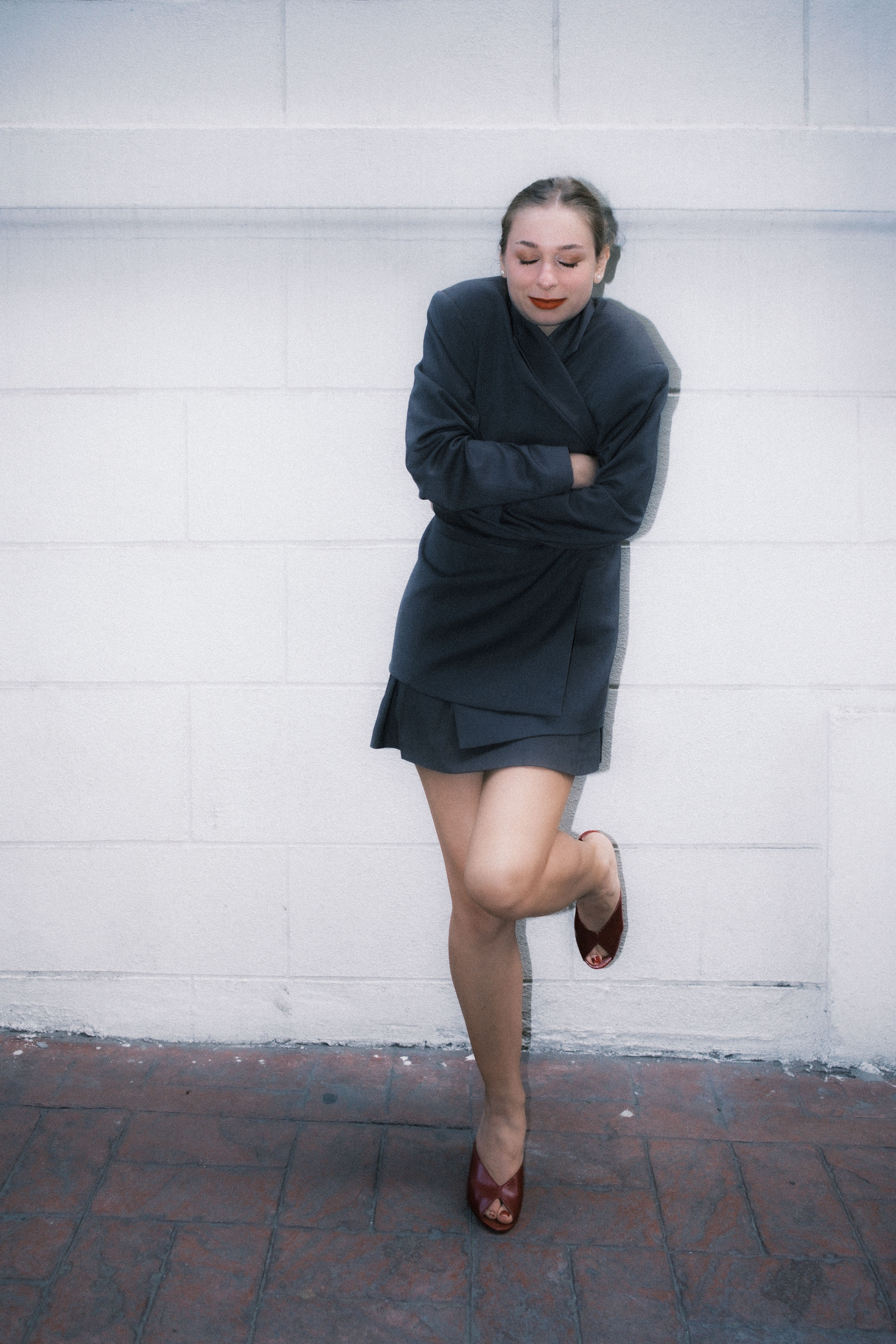 Woman Standing Still as Crowd Blurs Around Her · Free Stock Photo