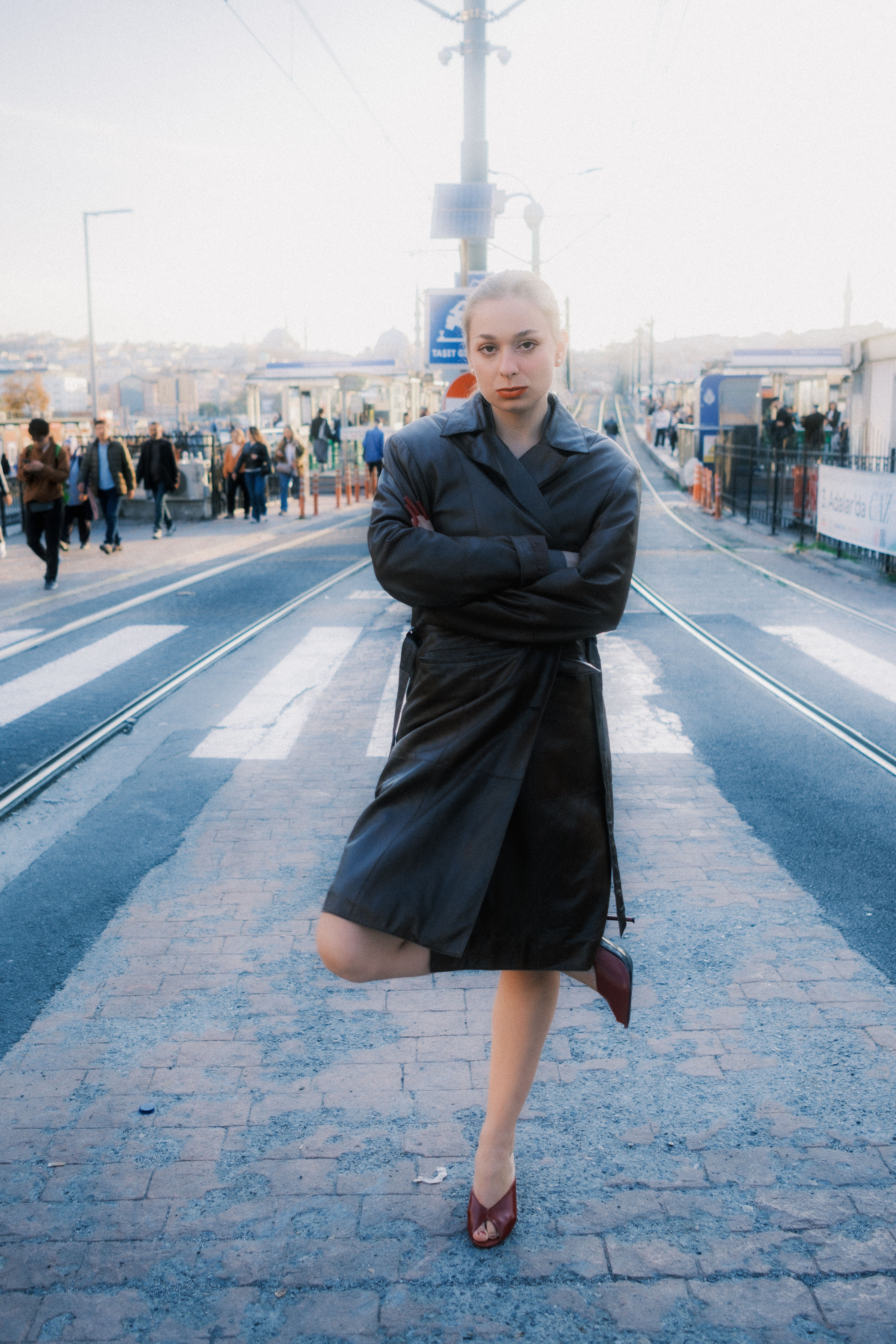 Woman Standing Still as Crowd Blurs Around Her · Free Stock Photo