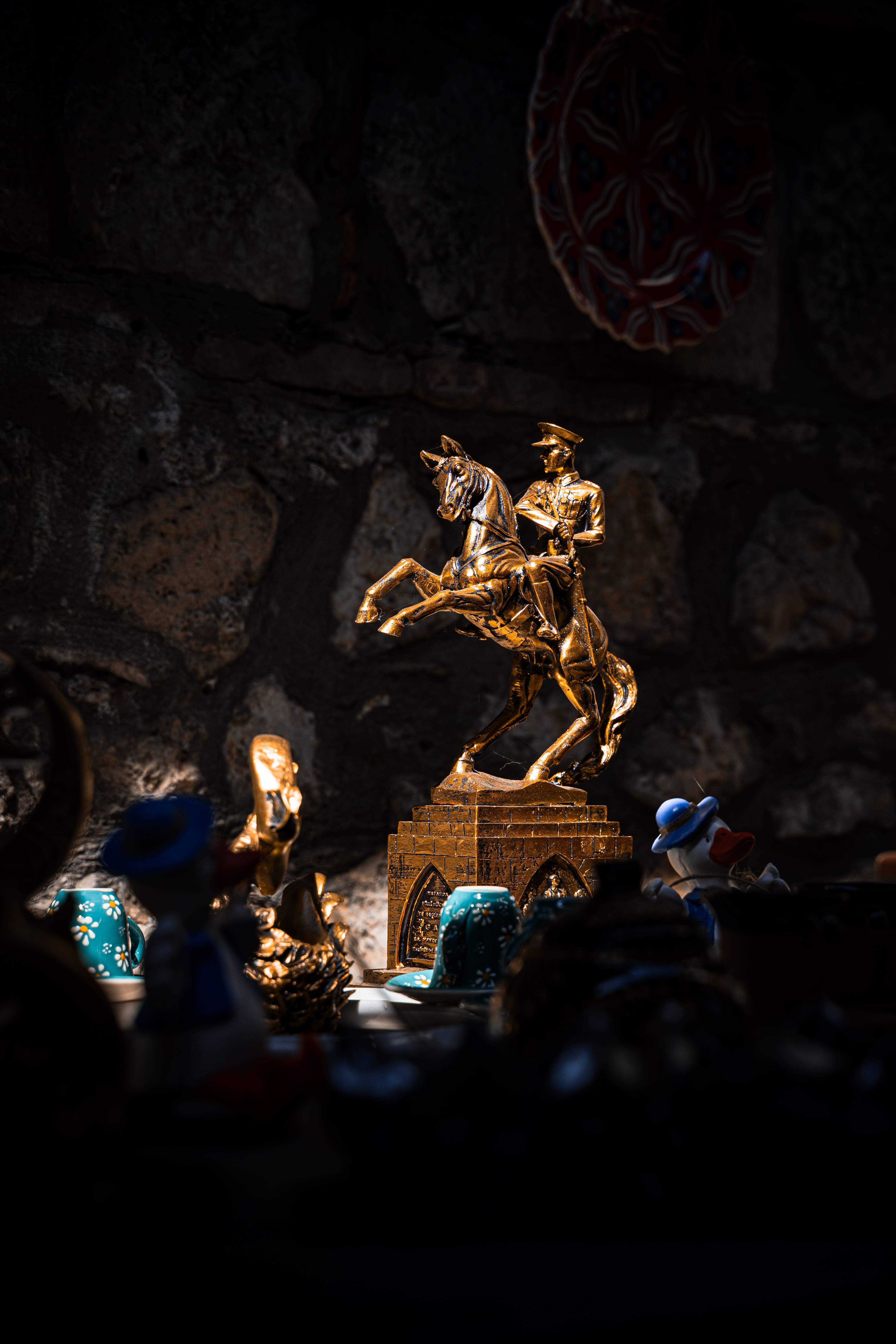 Golden Statue in Dramatic Lighting Showcase · Free Stock Photo