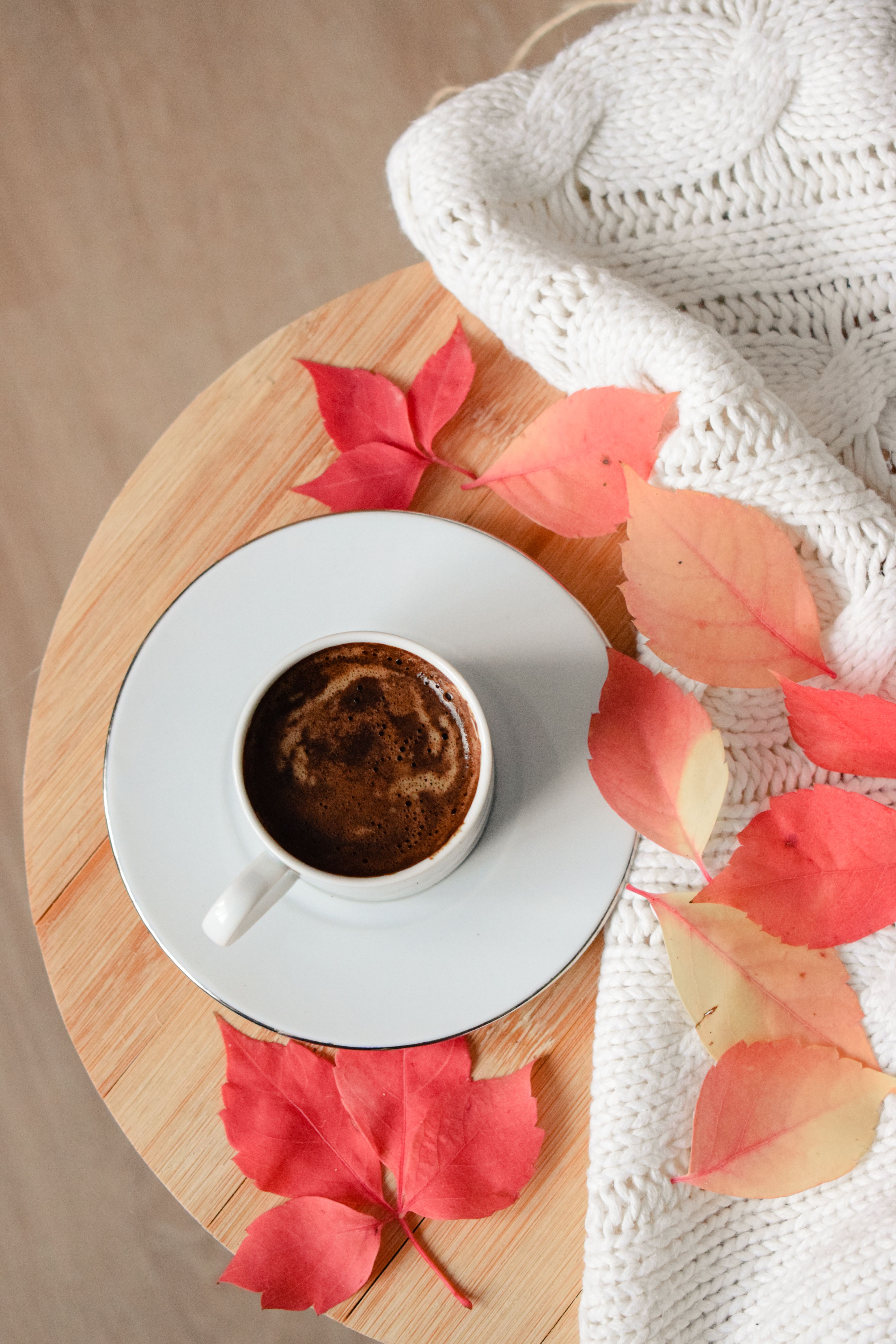 Cozy Autumn Scene with Coffee and Leaves · Free Stock Photo