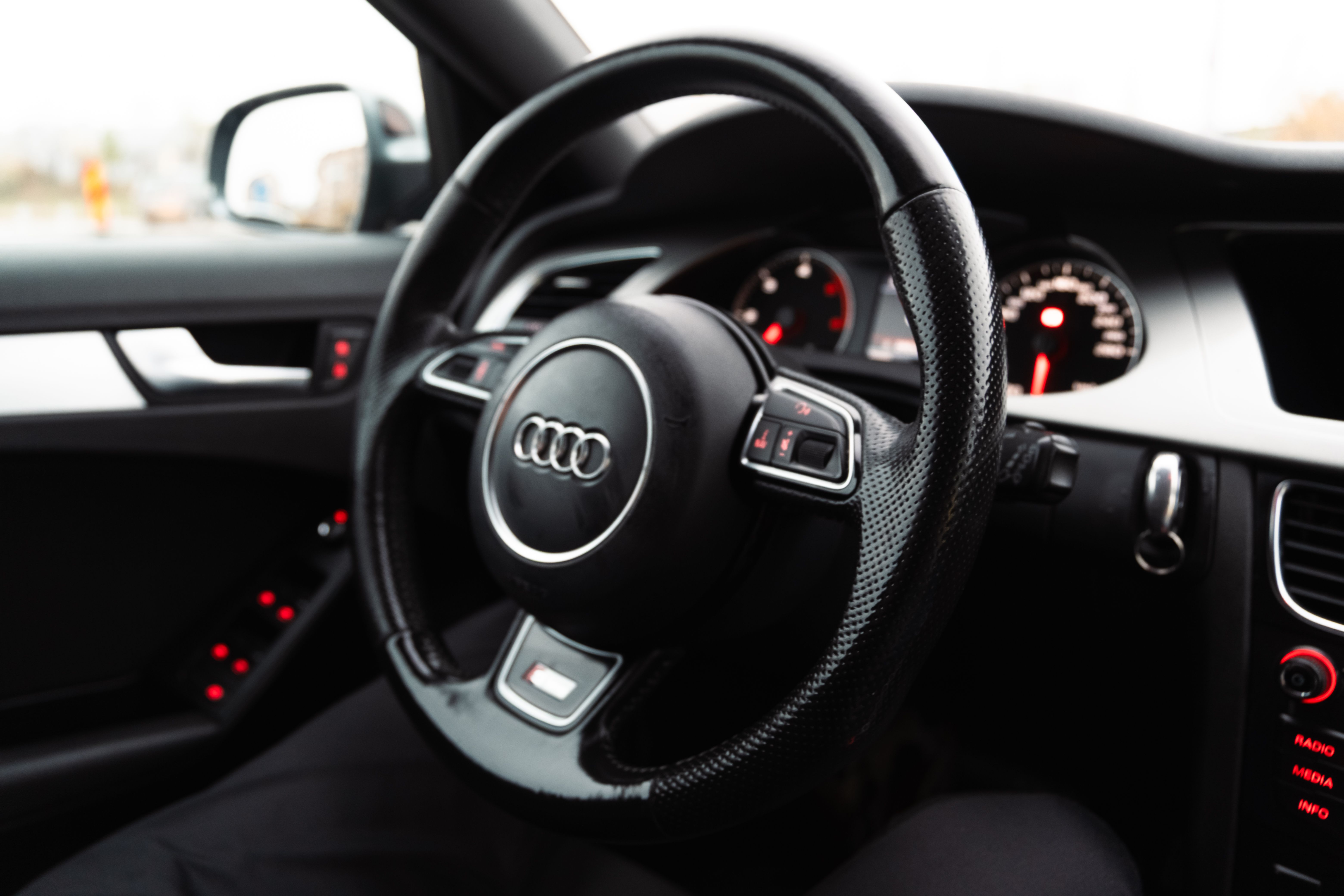 Luxury Car Steering Wheel Detail Shot · Free Stock Photo