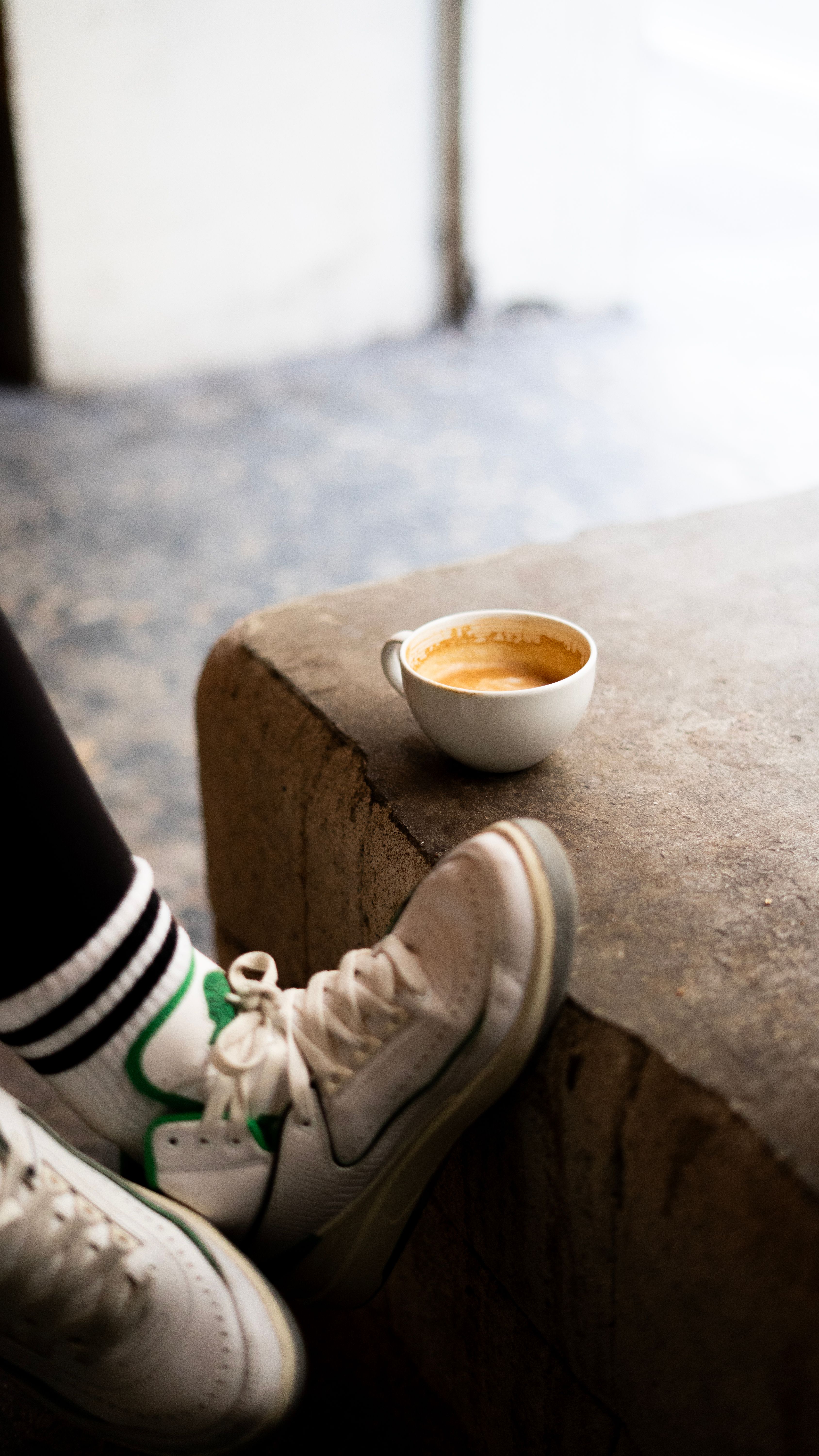 Relaxed Coffee Moment with Sneakers · Free Stock Photo