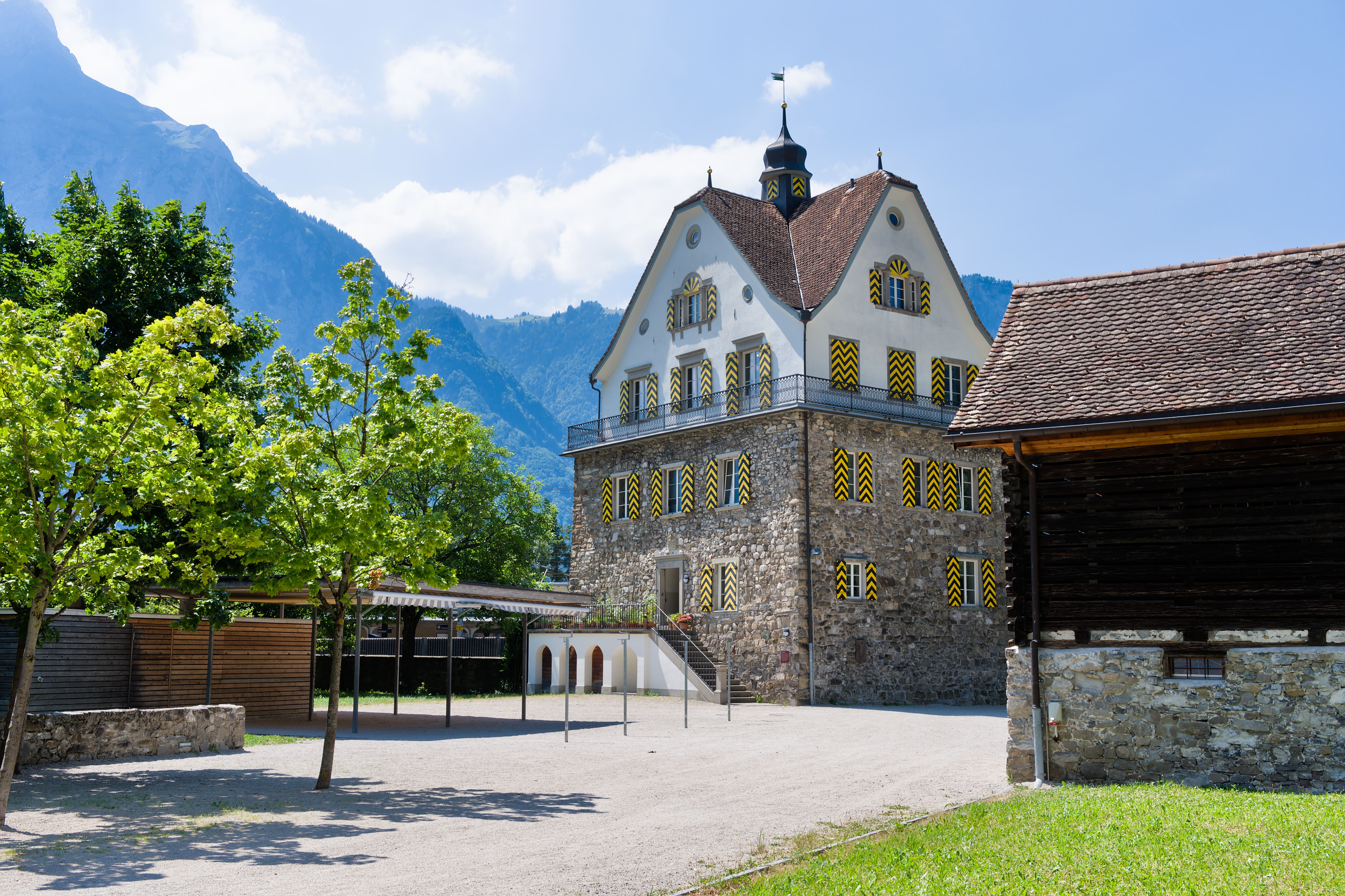 Historic Swiss Building in Mountainous Scenery · Free Stock Photo